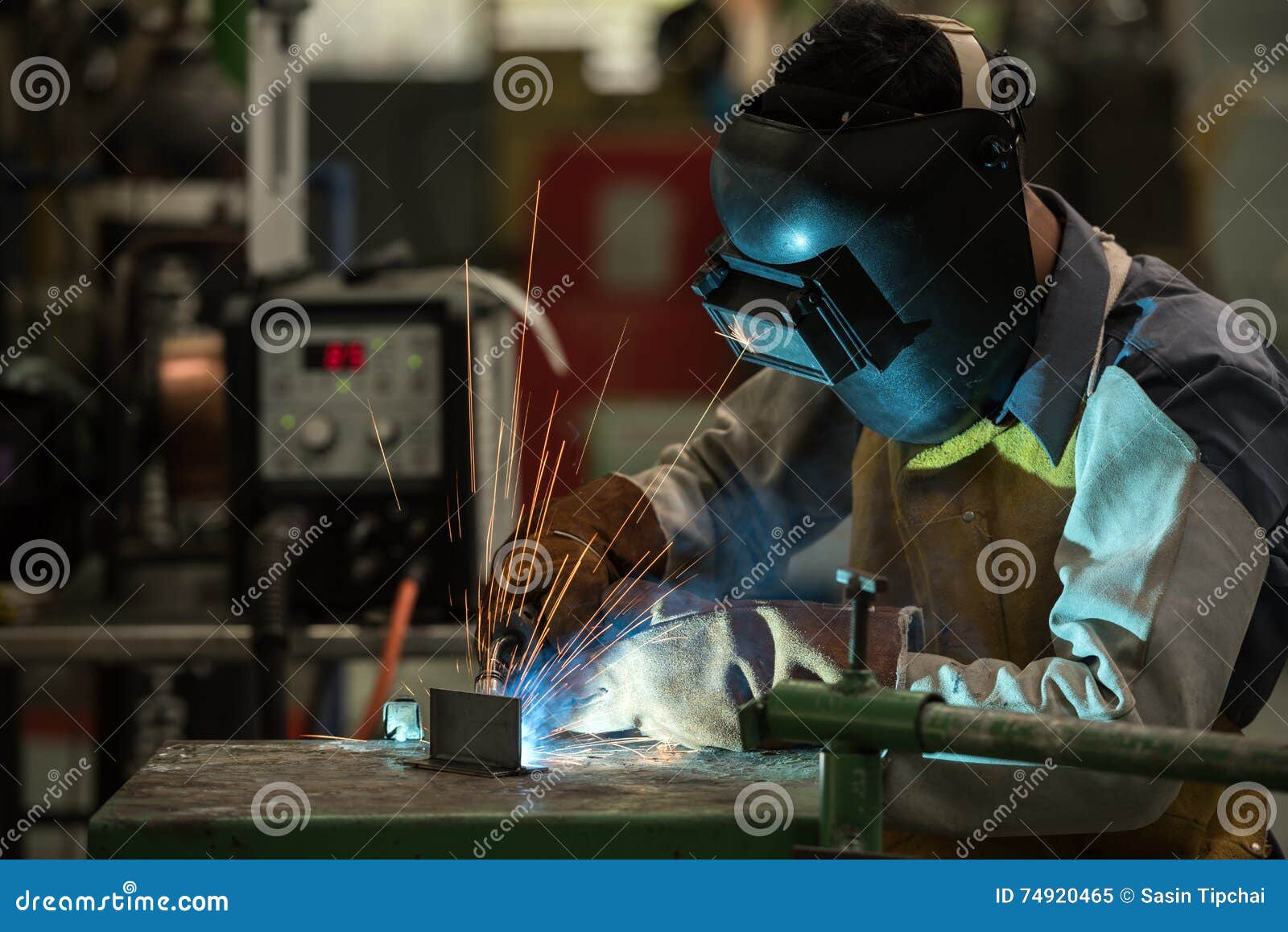 Welding worker in factory stock image. Image of iron - 74920465