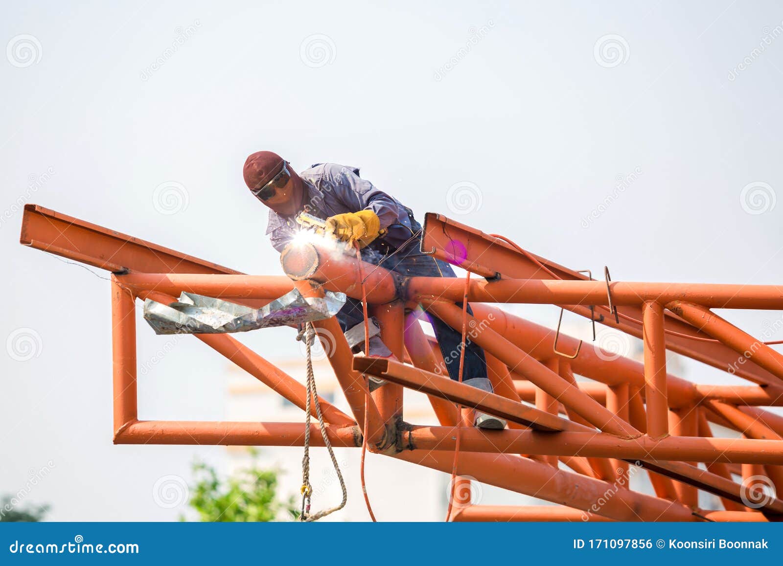 The Welding Workers at Structures Site. Worker is Welding Steel ...