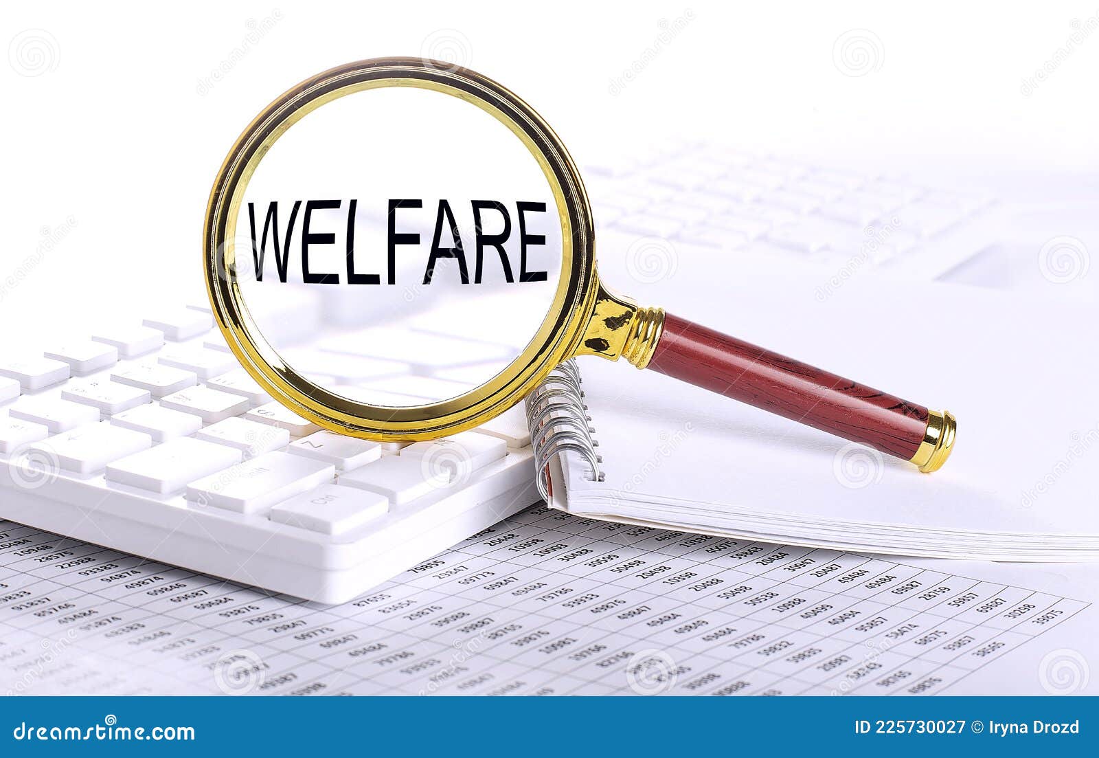 WELFARE Word through Magnifying Glass on Keyboard on the Chart Stock ...