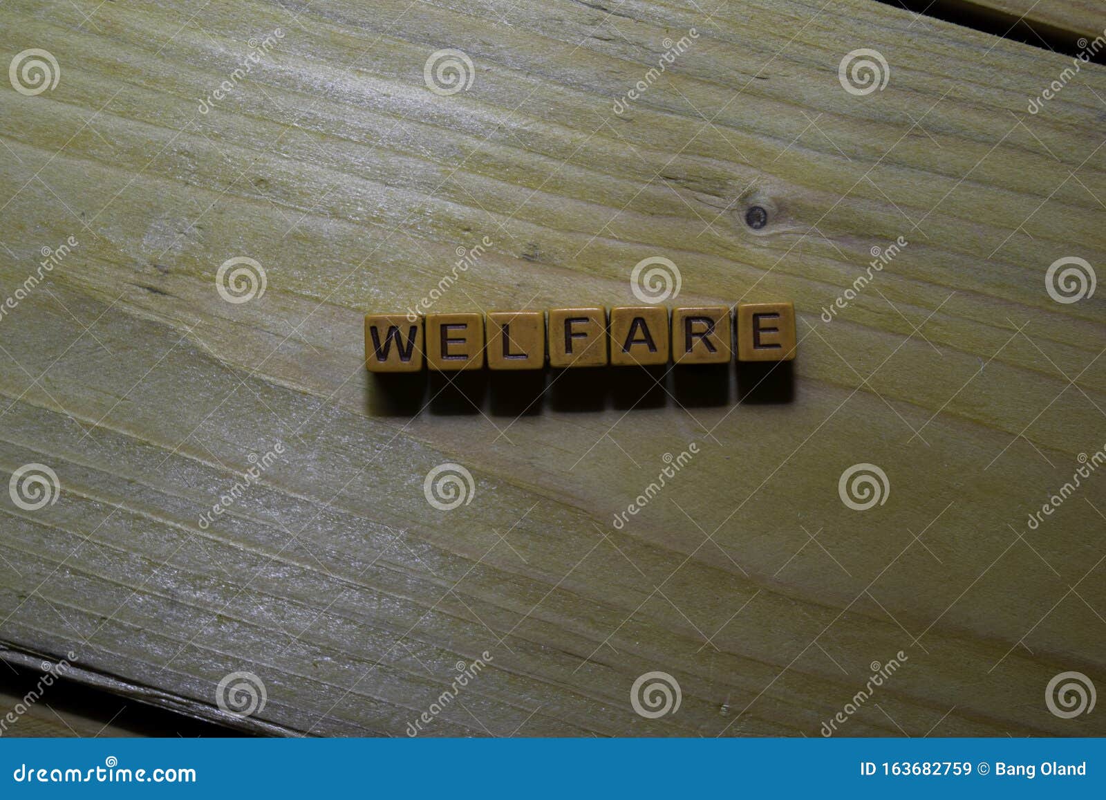 Welfare Word on Wooden Blocks Isolated on Wooden Table Stock Image ...
