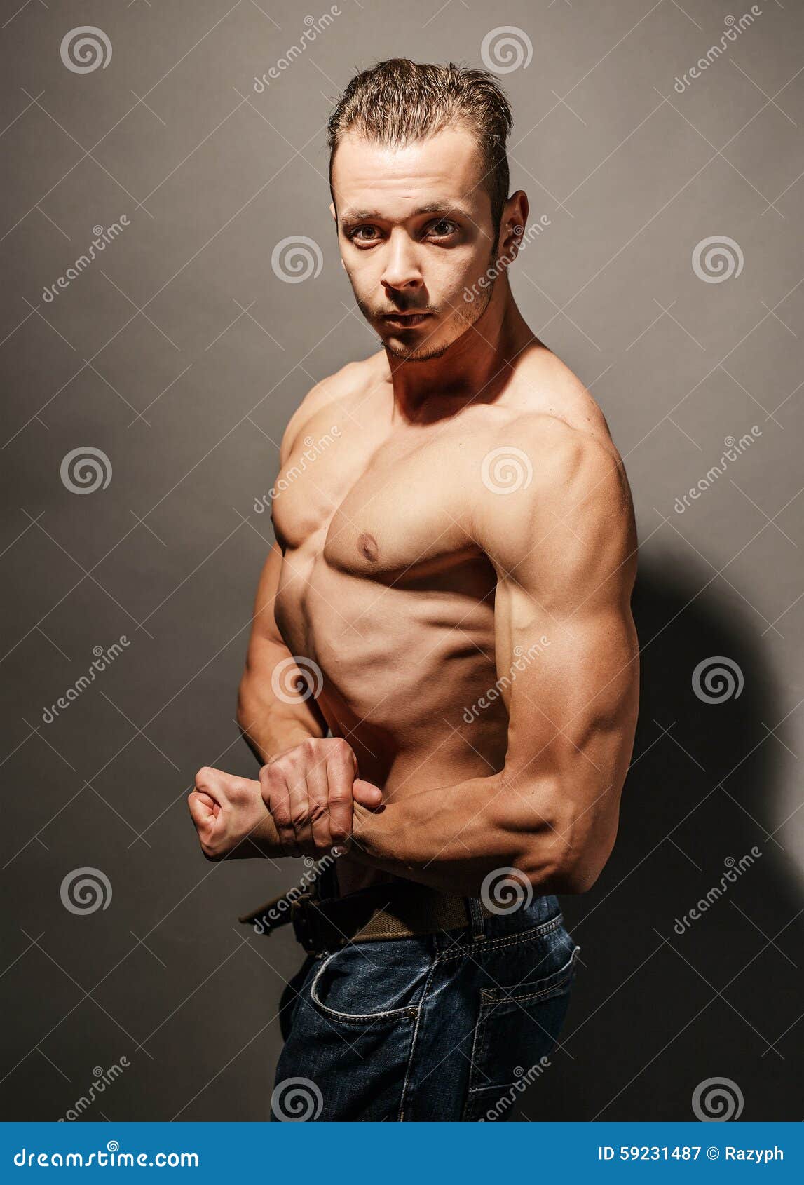 Well-build And Excited Models Sit At Edge Of Swimming Pool. They Hold ...