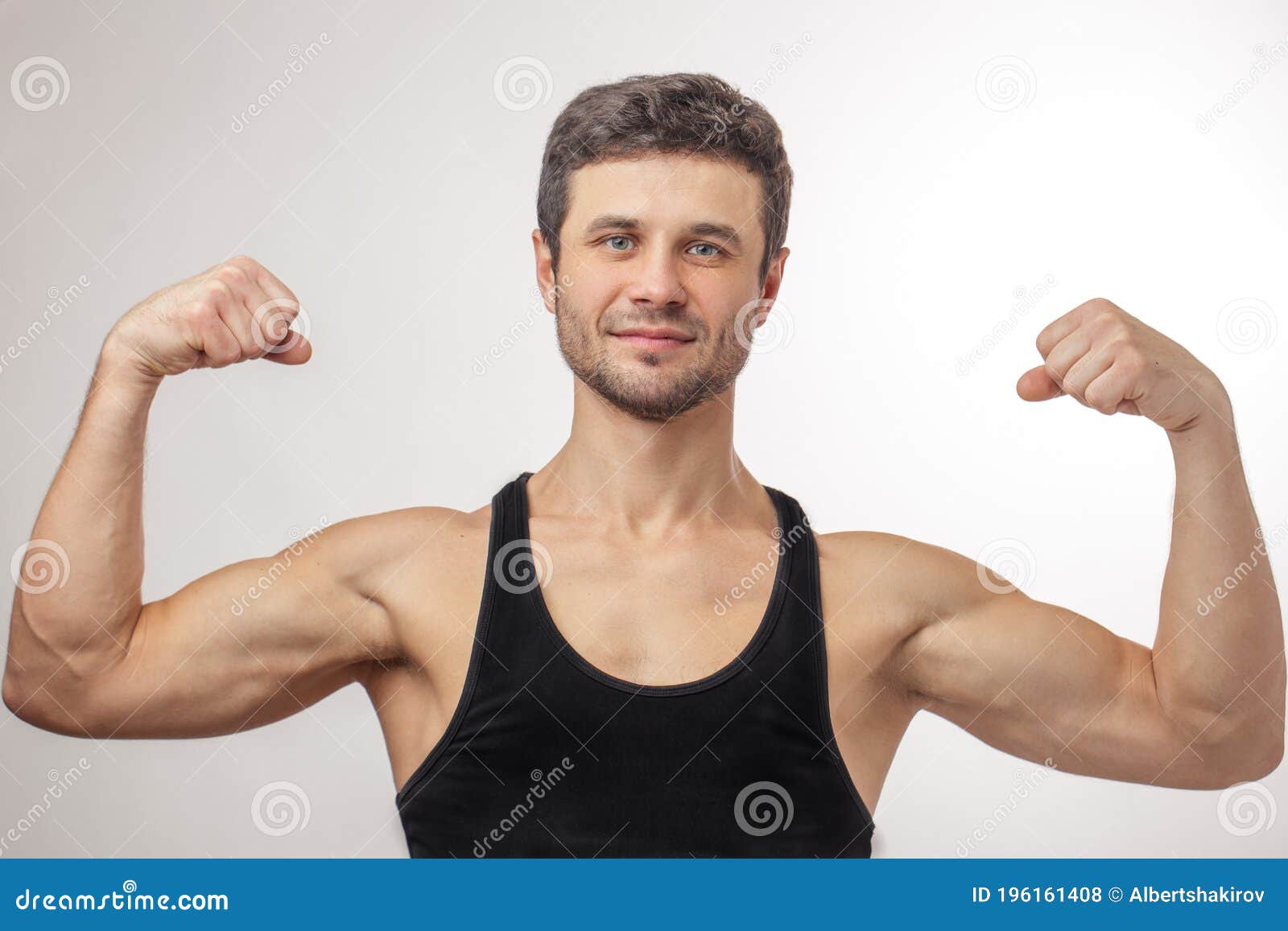 A Well -built Guy Showing His Strong Arms Stock Photo - Image of ...