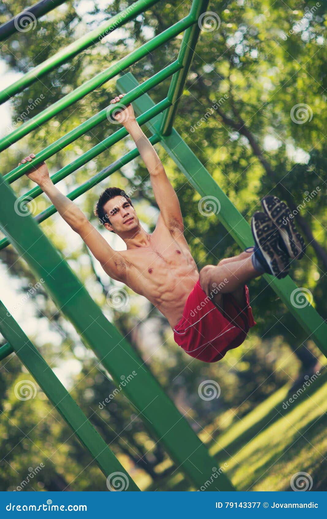 Well Built Muscular Man Doing a Physical Exercise Stock Image - Image ...