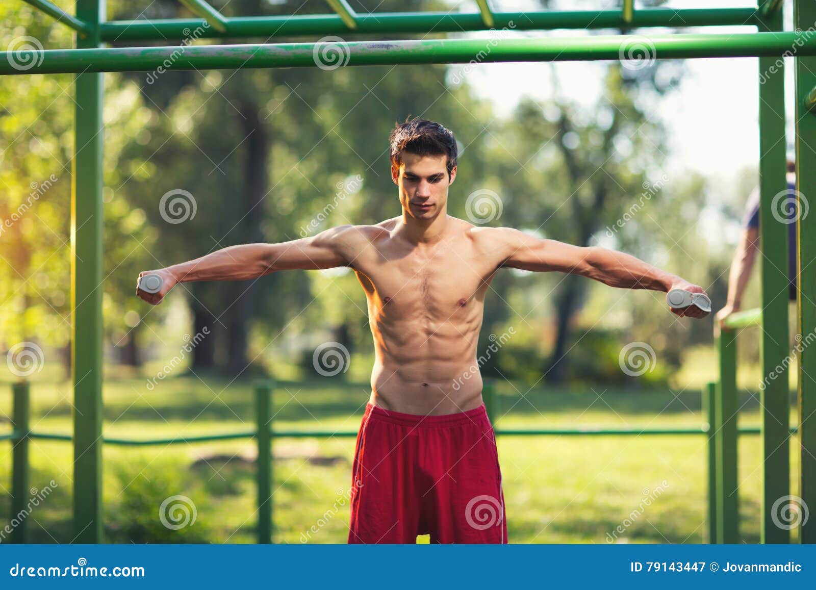Well Built Muscular Man Doing a Physical Exercise Stock Image - Image ...