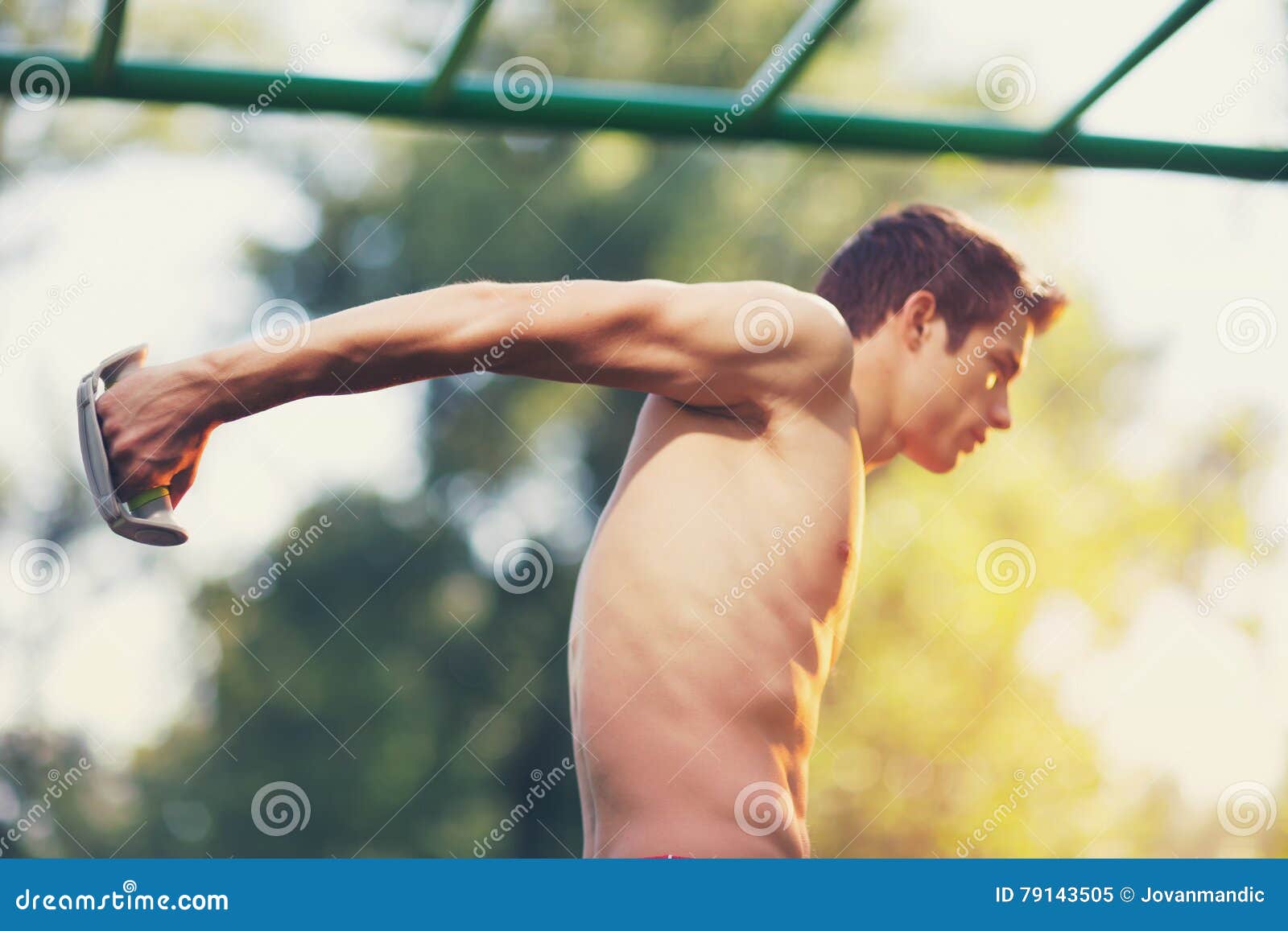 Well Built Muscular Man Doing a Physical Exercise Stock Image - Image ...