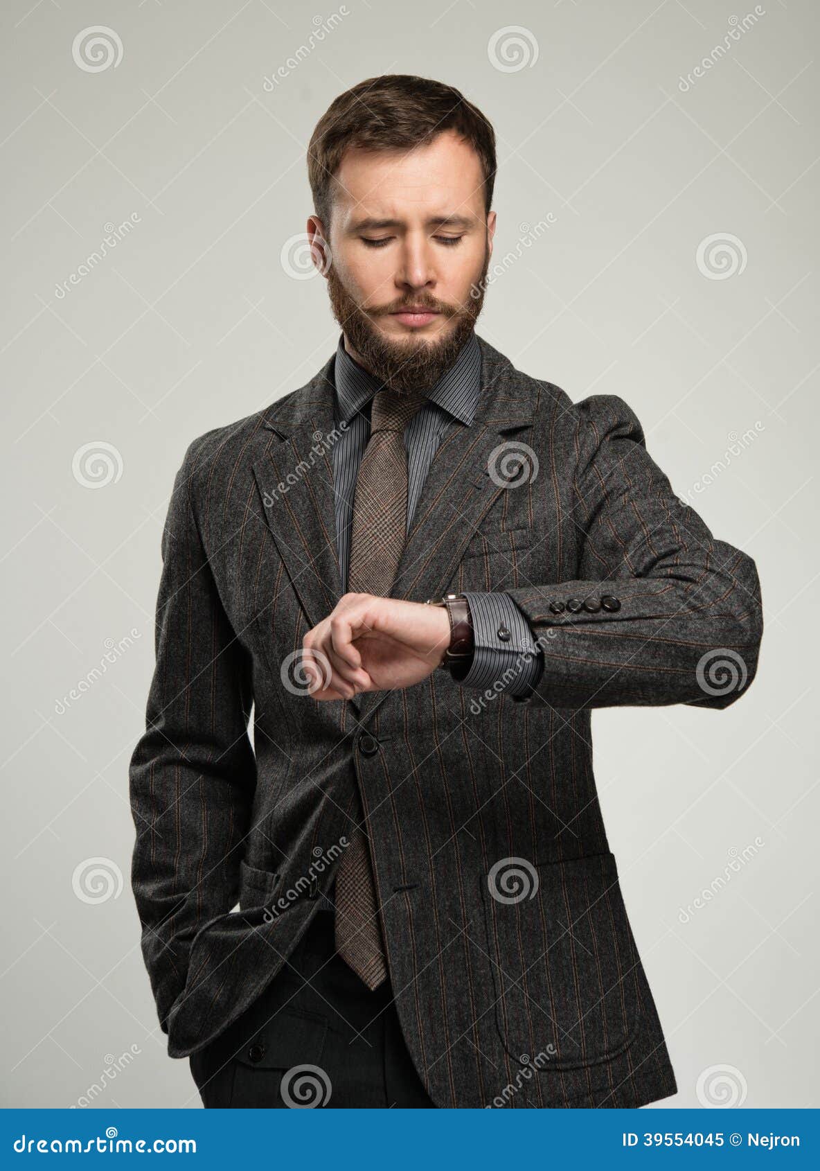 Well-dressed Man Looking at Wrist Watch Stock Image - Image of sharp ...