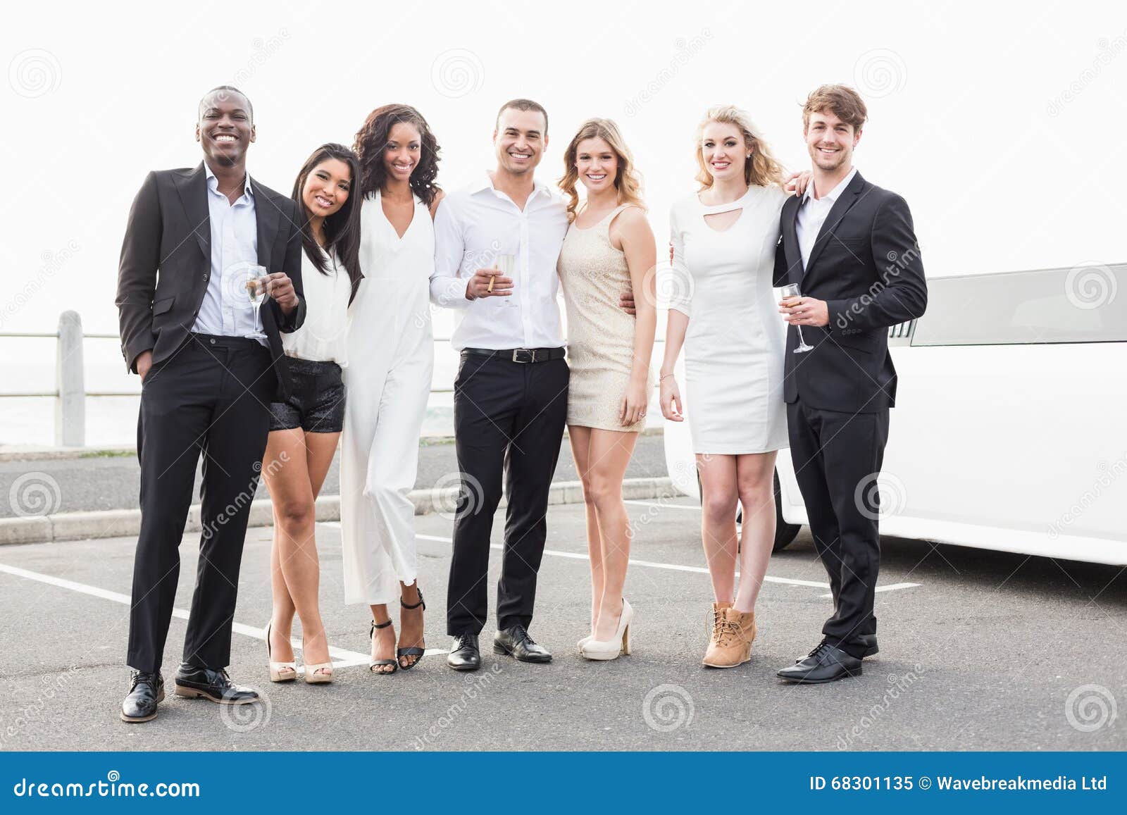 Well Dressed People Posing Next To a Limousine Stock Image - Image of ...