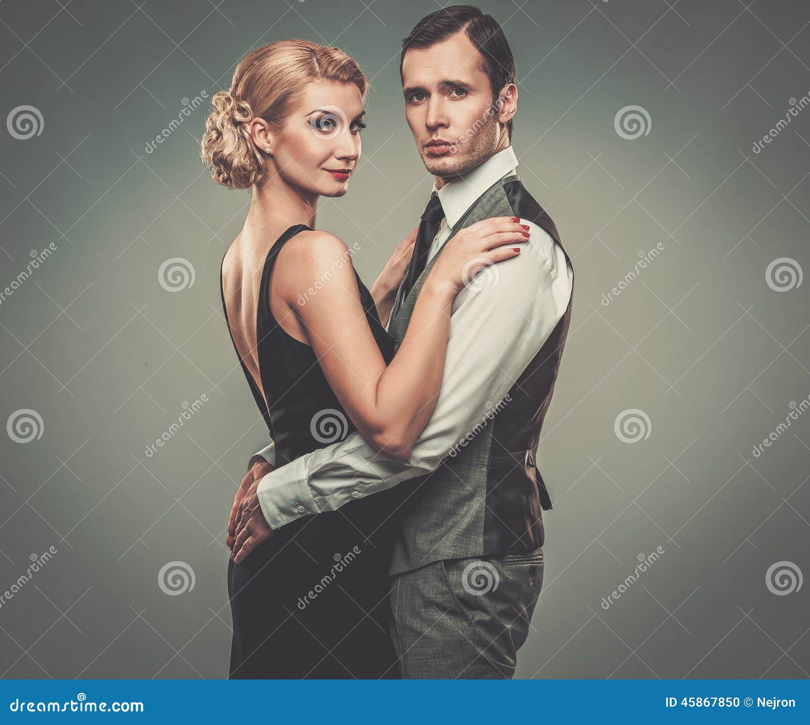 Well-dressed Retro Style Couple Stock Photo - Image of hands ...