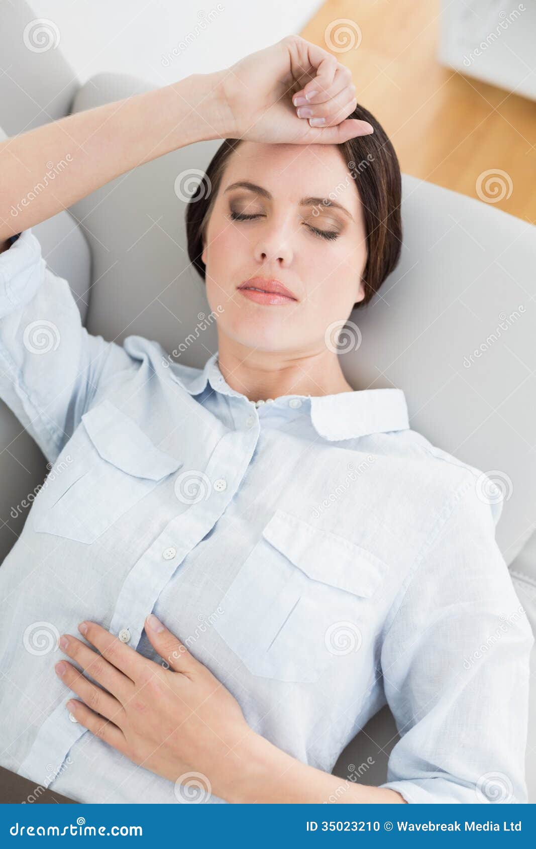Well Dressed Young Woman Resting on Sofa Stock Photo - Image of woman ...