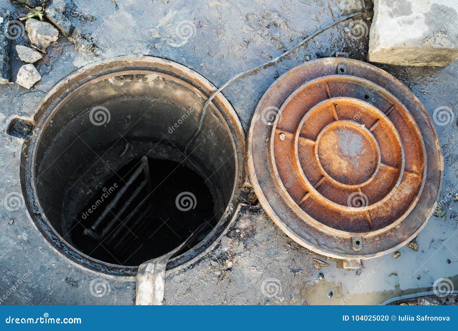 The Well is Open. the Lid is Near Stock Photo - Image of blurred, iron ...