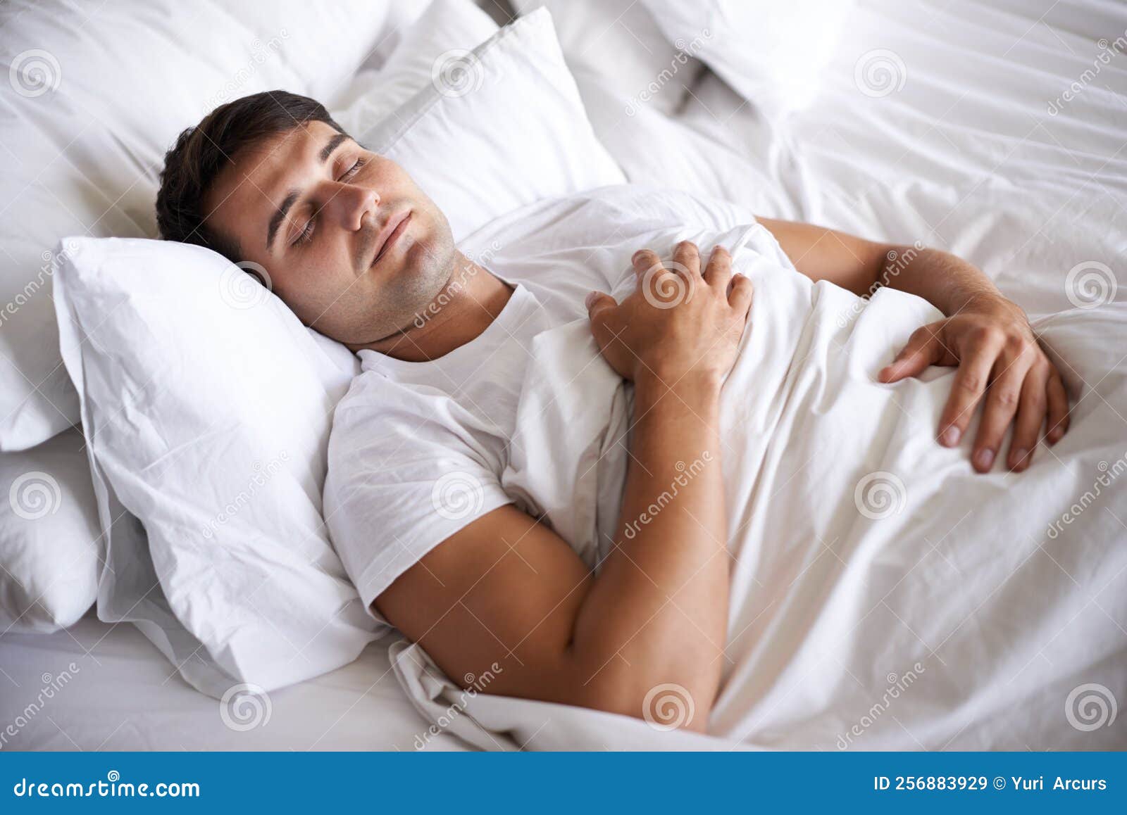 Well Rested for a Busy Day. a Young Man Sleeping in Bed. Stock Image ...