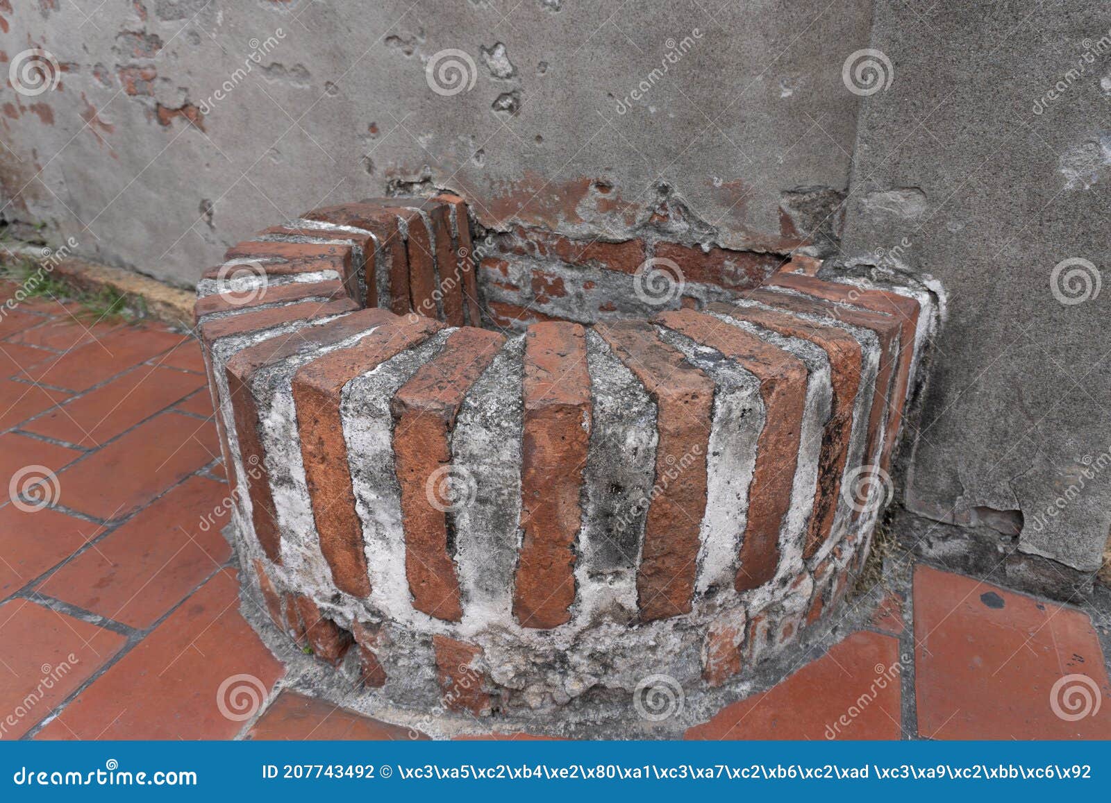 The well by the wall stock photo. Image of floor, ceramic - 207743492