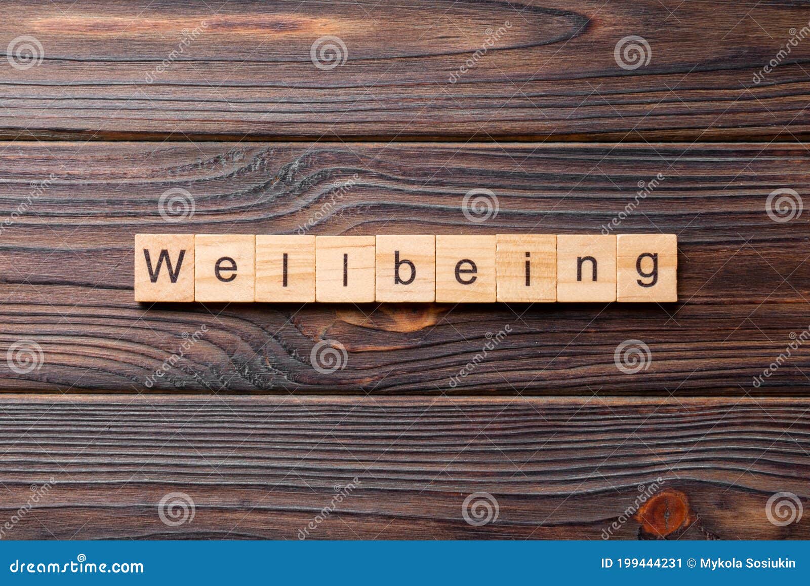 Wellbeing Word Written on Wood Block. Wellbeing Text on Cement Table ... Wellbeing Word Written on Wood Block. Wellbeing Text on Cement Table ...