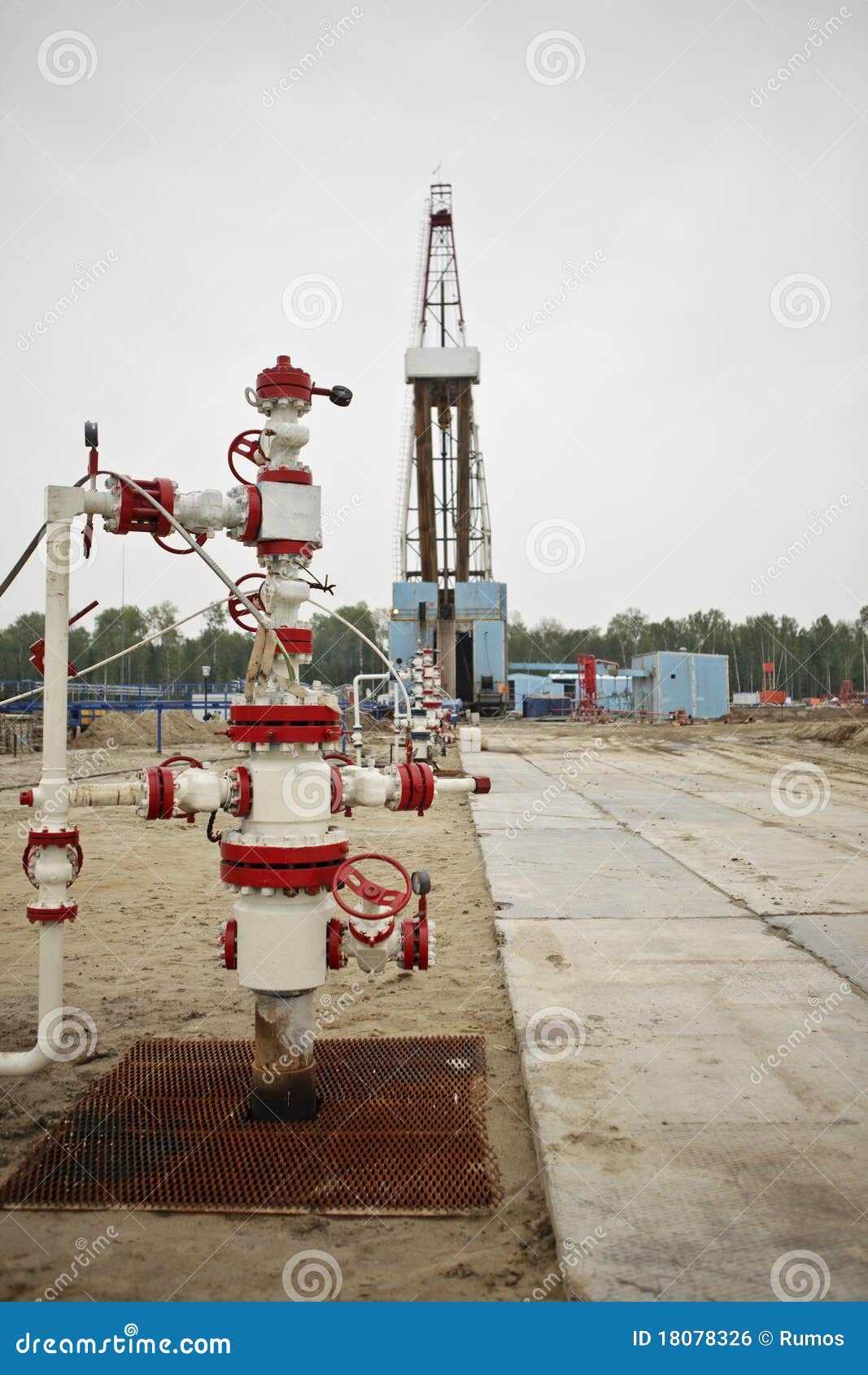Wellhead Against the Rig in Oifield Stock Photo - Image of fuel ...