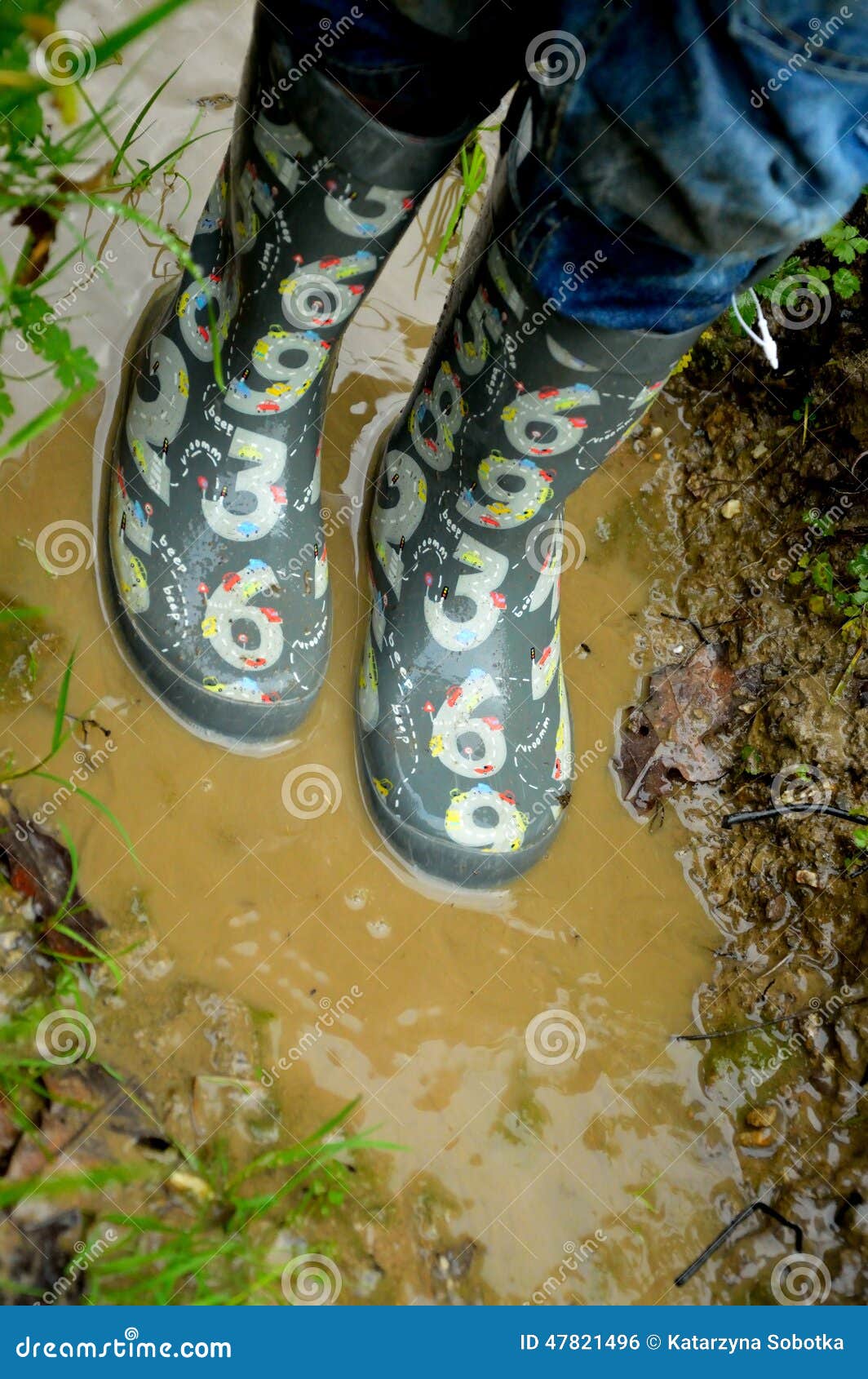 Wellington Boots in a Puddle Stock Photo - Image of youth, rain: 47821496