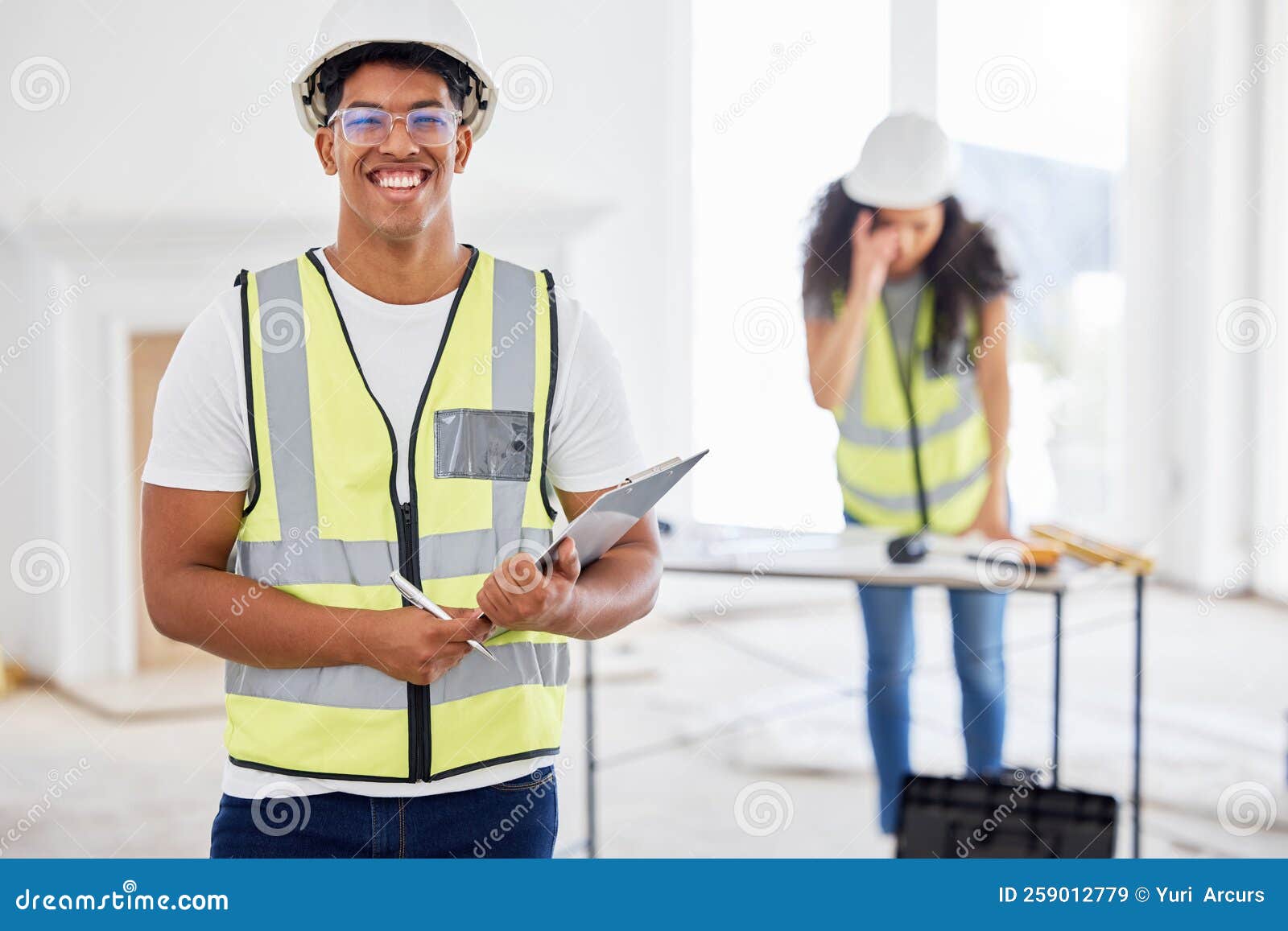 Were All Set Here. a Handsome Young Contractor Standing Inside and ...