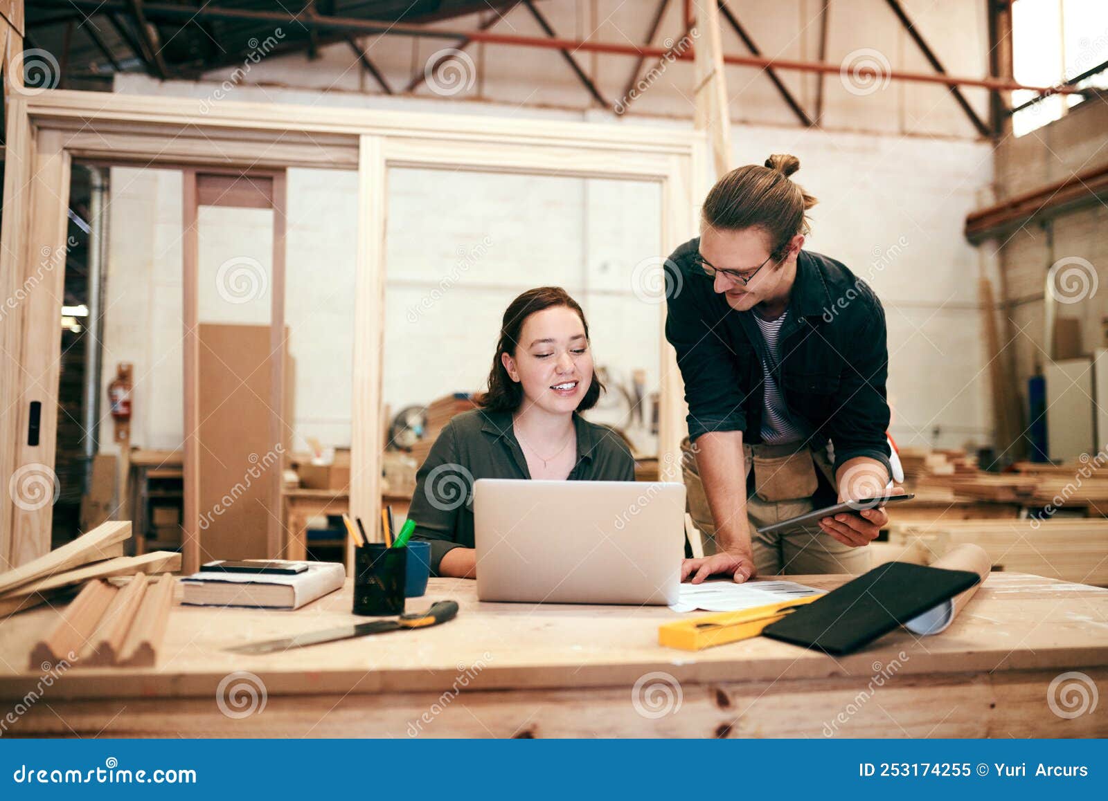 Were Getting so Much Work Done Together. Two Young Carpenters Using a ...