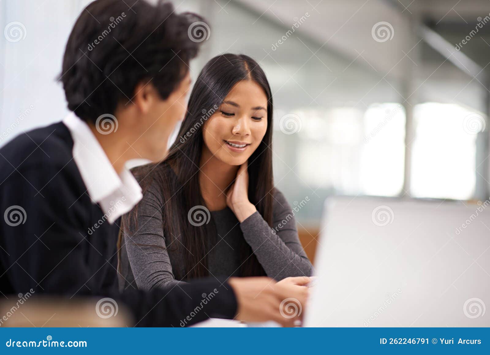 Were Making Progress. Two Business Colleagues Working Together at a ...