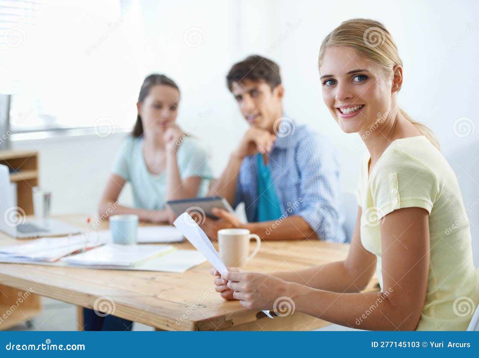 Were always Working on Something New. Three Colleagues Working in an ...