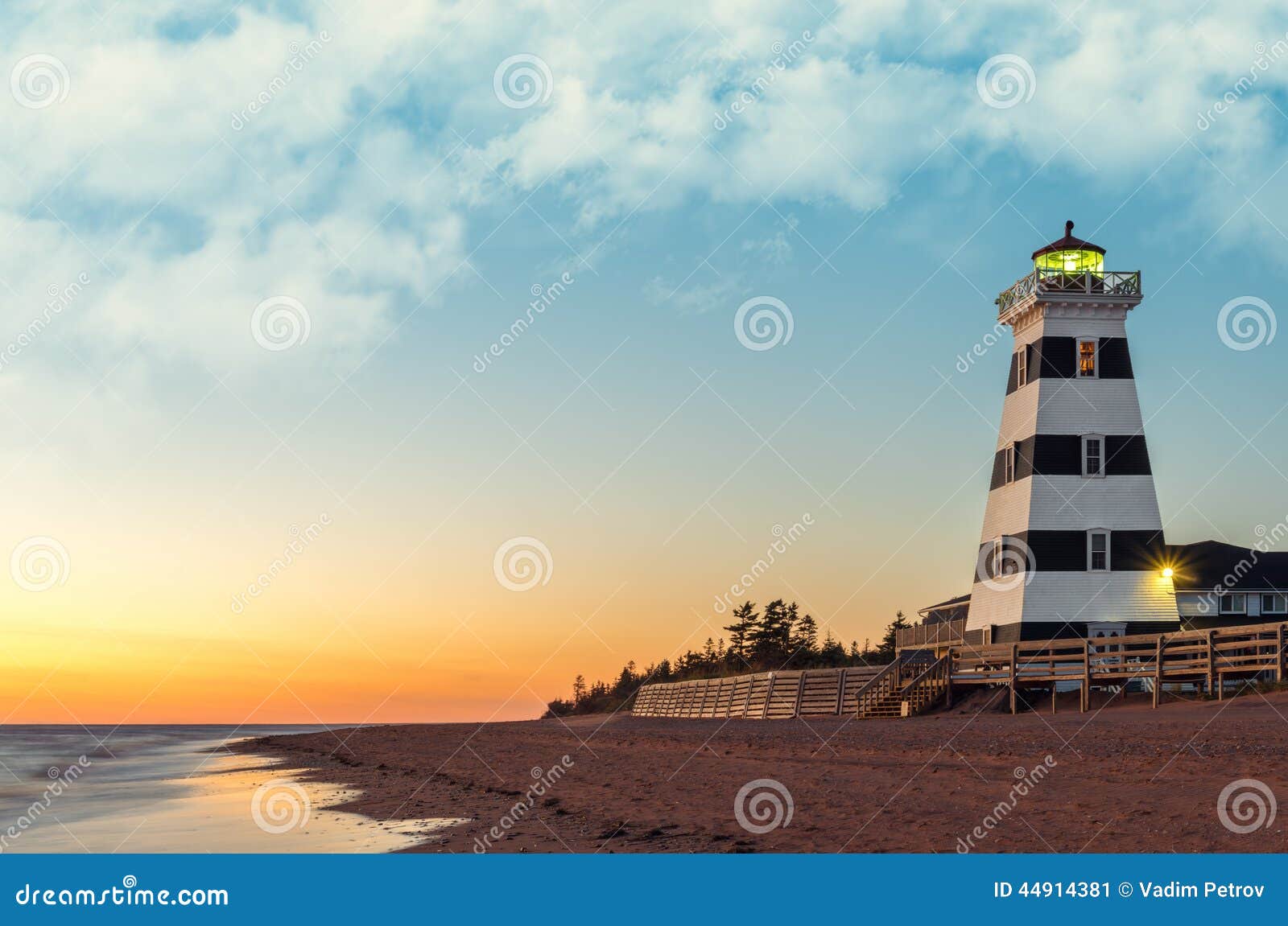 West Point Lighthouse at Sunset Stock Image - Image of canadian, ocean ...