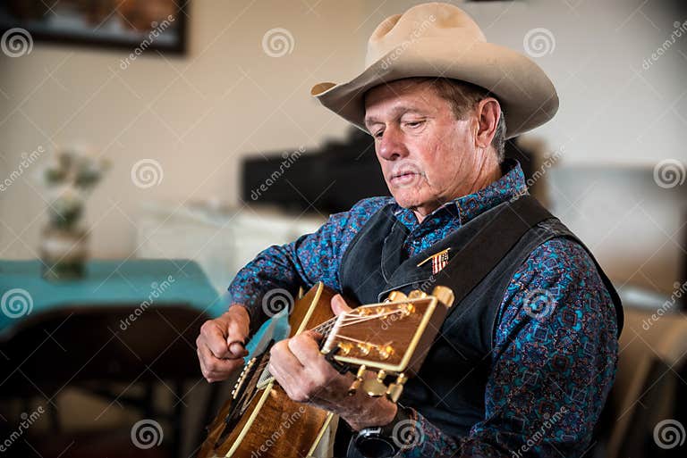 Western Cowboy Playing Guitar Stock Image - Image of fingers, music ...
