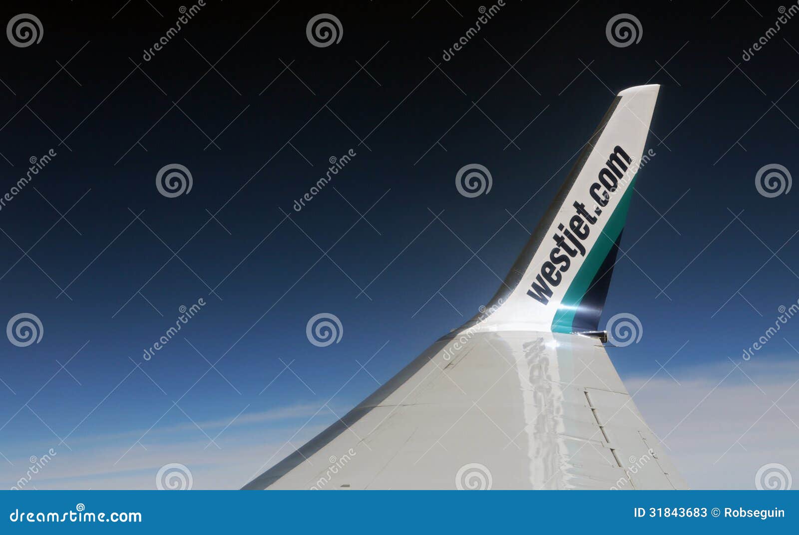 Westjet Wingtip editorial stock photo. Image of canadian - 31843683