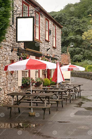 Wet afternoon pub stock photo. Image of table, house, unbrella - 2828806