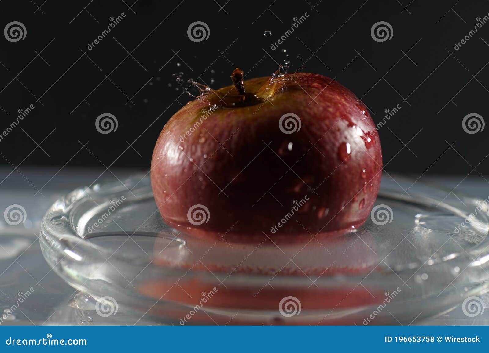 Wet apple in water stock photo. Image of fruit, eating - 196653758