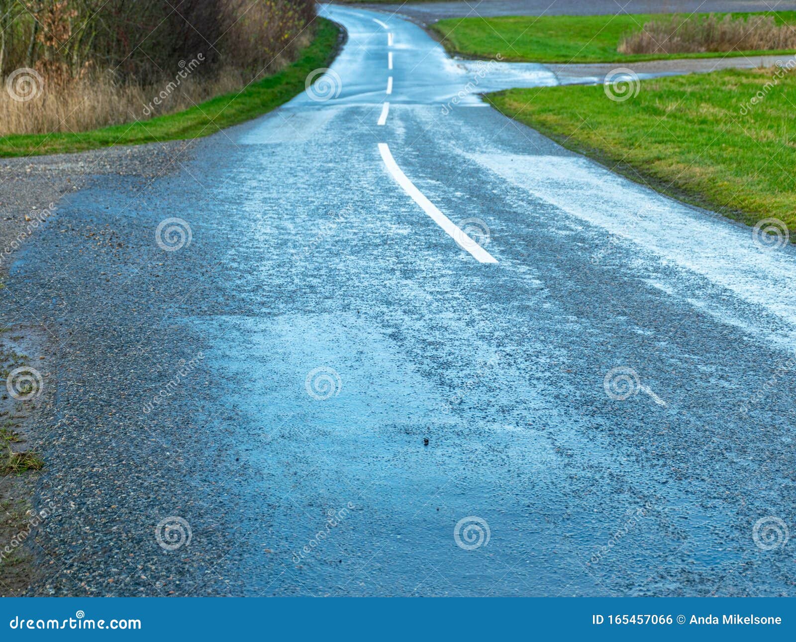 A wet asphalt road stock photo. Image of color, interesting - 165457066