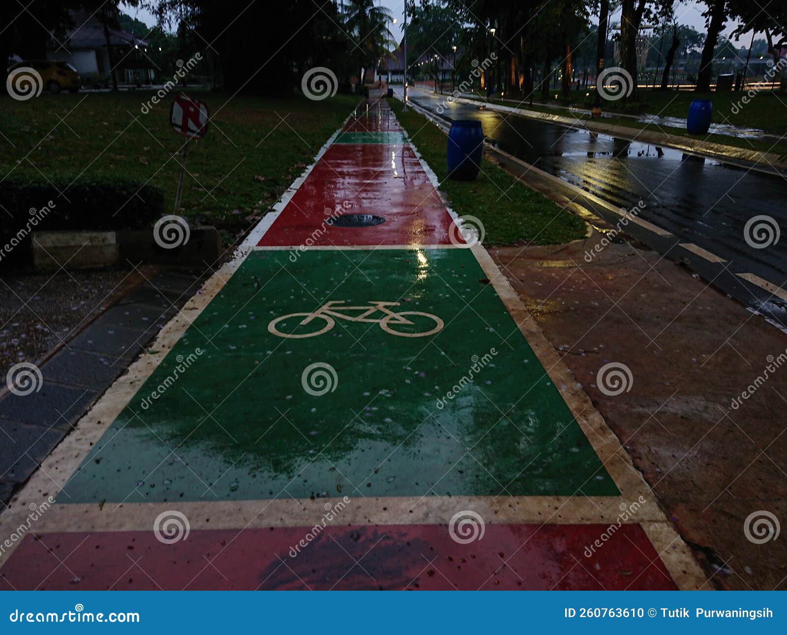 Wet Bicycle Track after Rain in the Evening Stock Photo - Image of ...