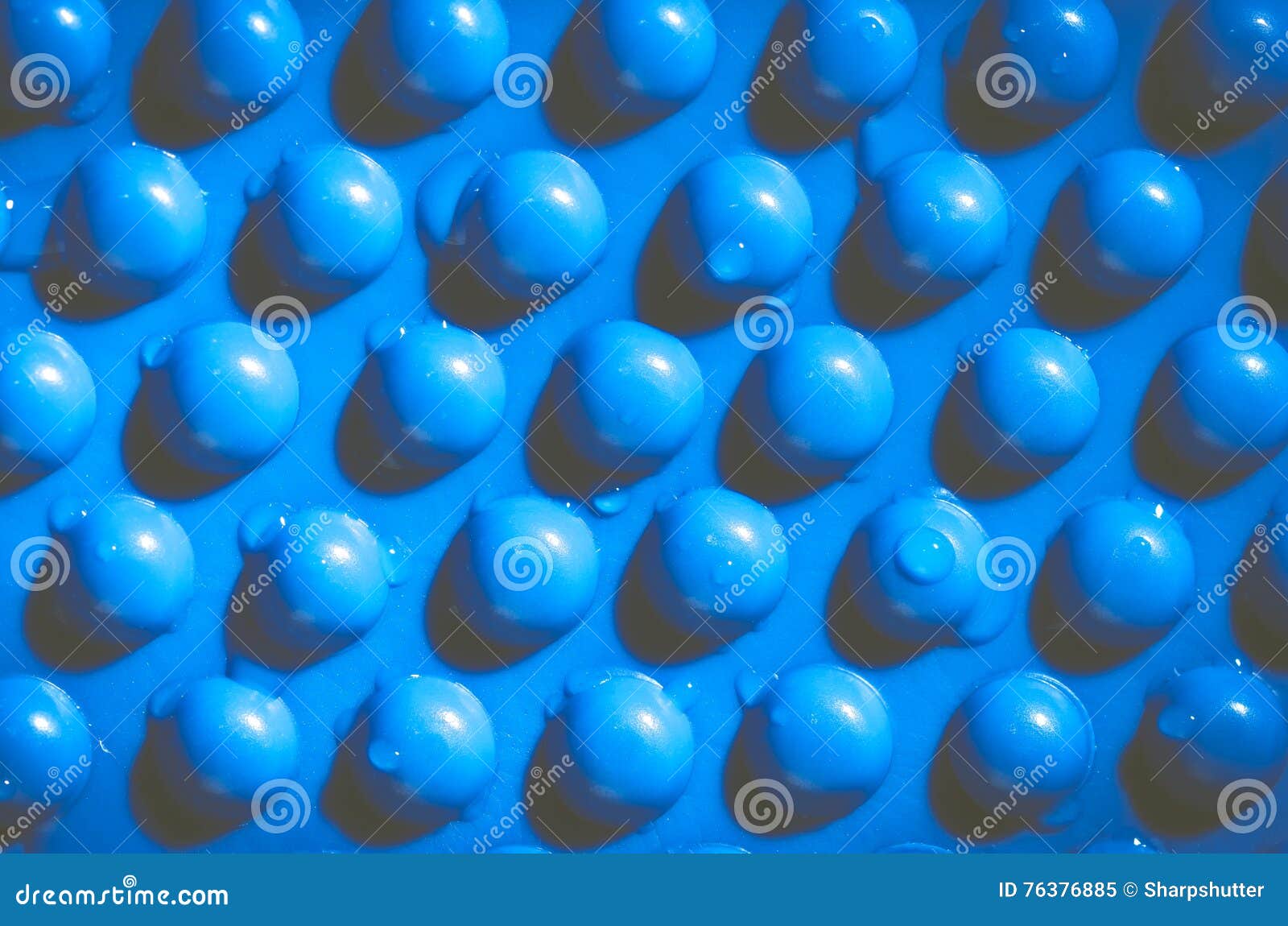 Wet blue bumpy surface stock image. Image of background - 76376885