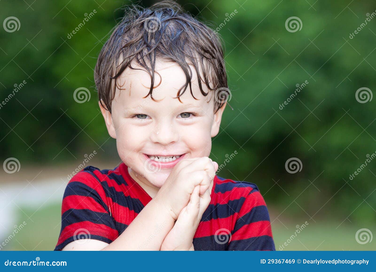 A Wet Boy Smiles Playing Outside Stock Image - Image of outdoors, young ...