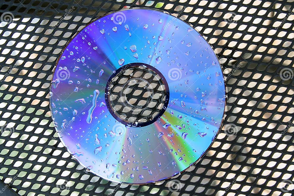 Wet CD Disc. Wet DVD Disc. Raindrops on Disc Stock Image - Image of ...