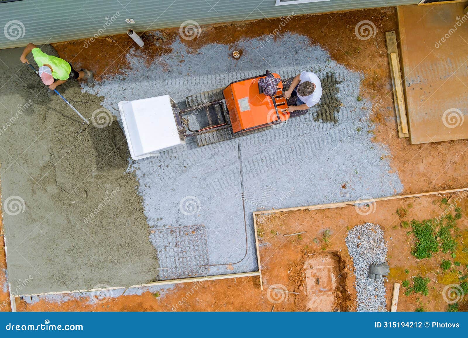 Wet Cement is Poured into Framework during Foundation Construction ...