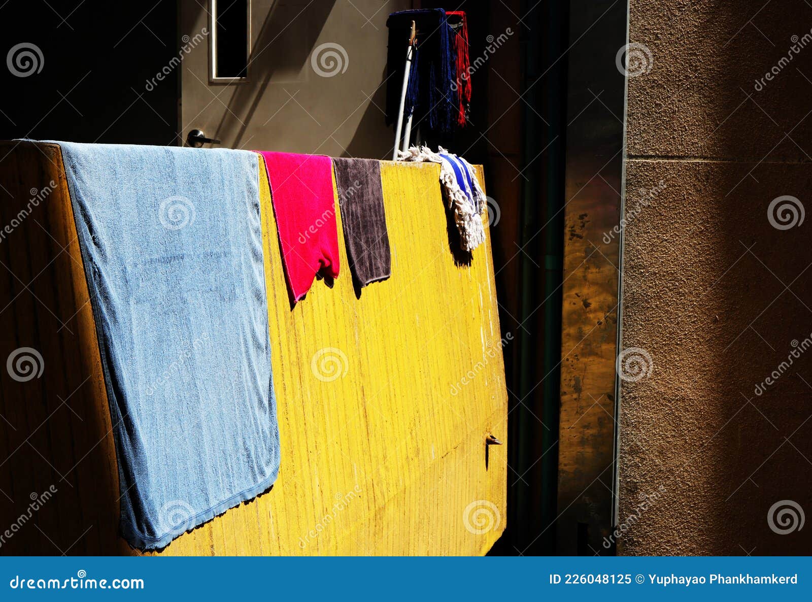 A Wet and Dirty Rag on the Wall. Stock Image - Image of clean, wall ...