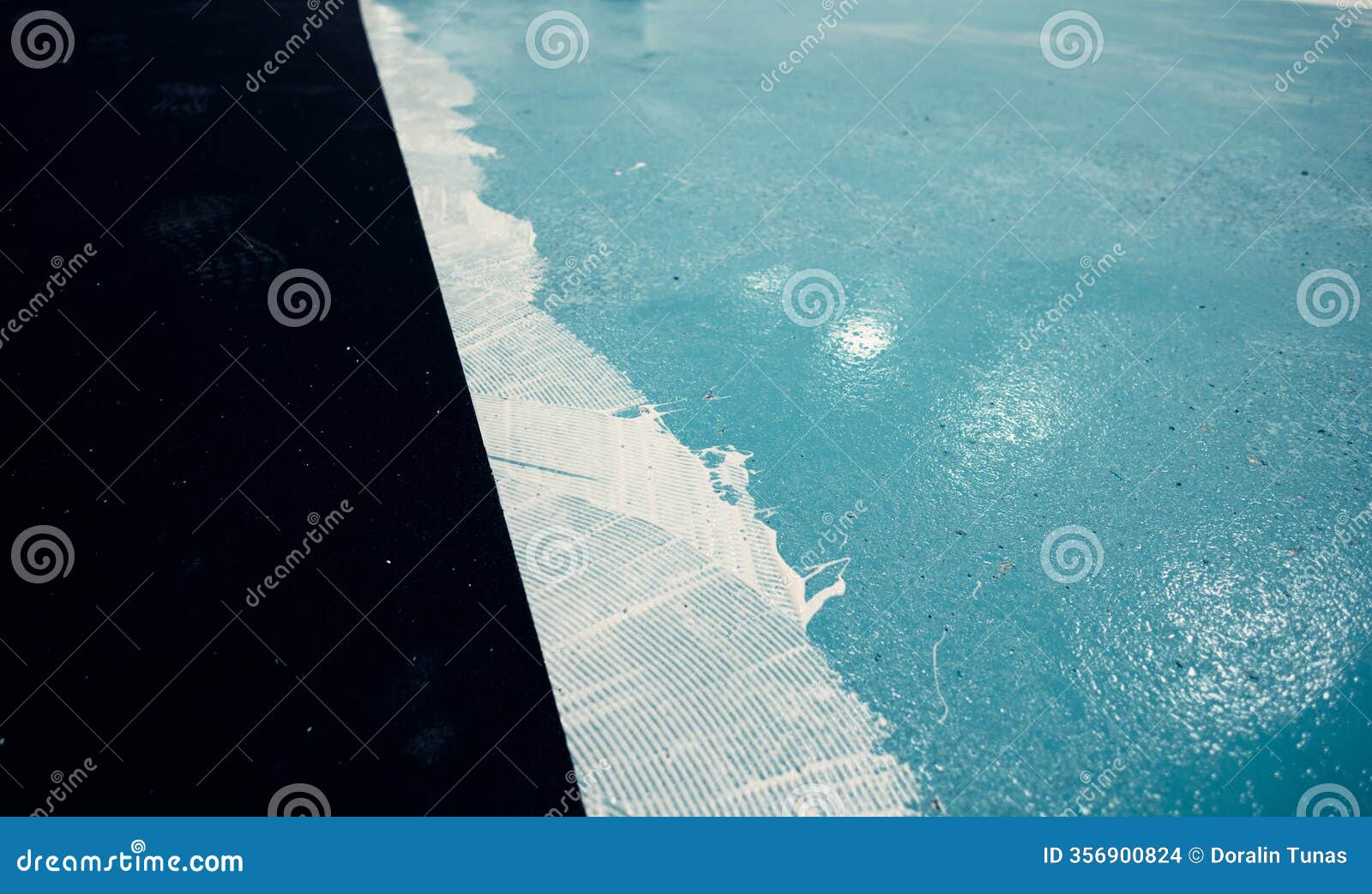 Construction Worker Applying Epoxy Resin on Industrial Floor Stock ...