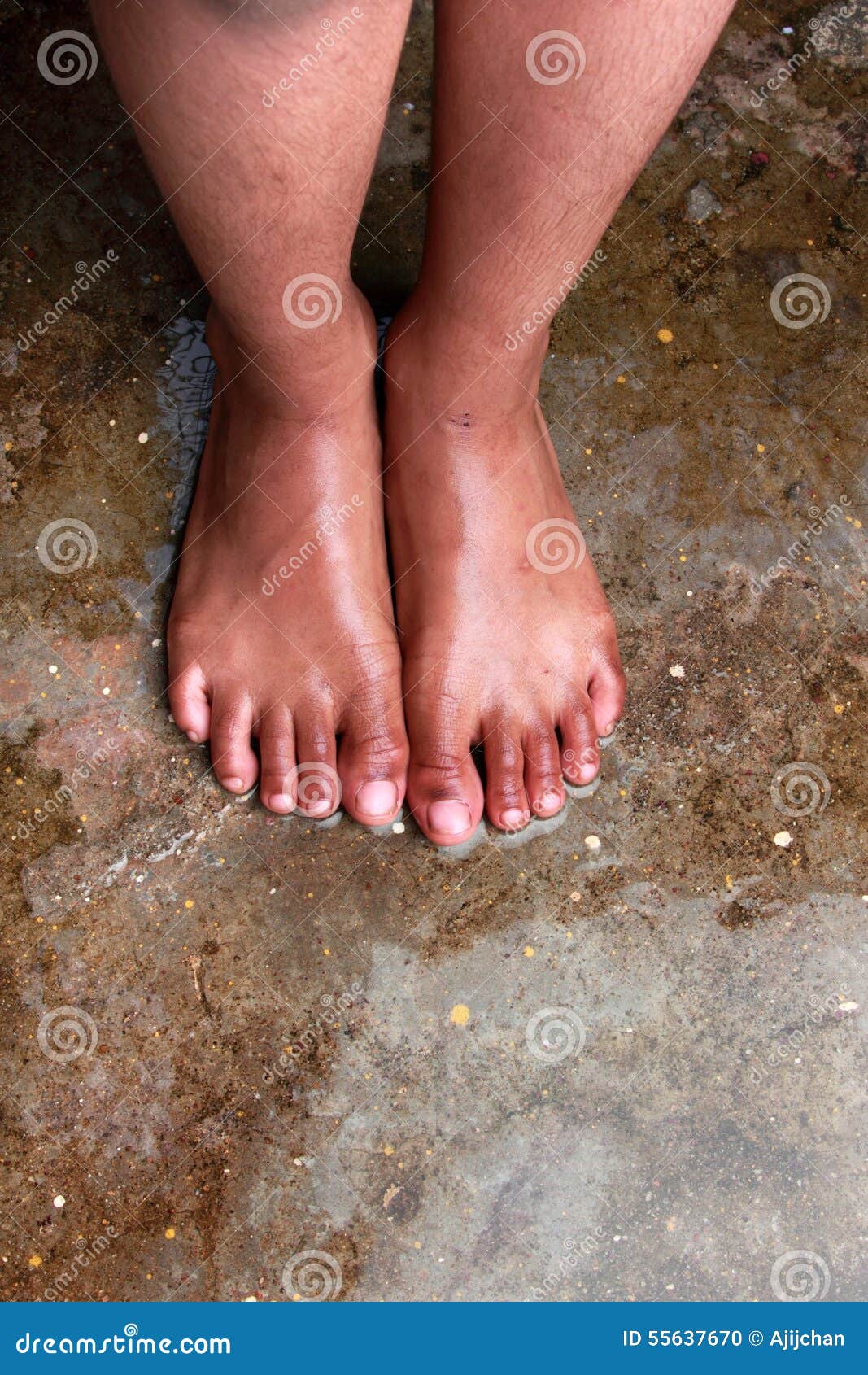 Wet feet of a child stock photo. Image of childhood, cement - 55637670