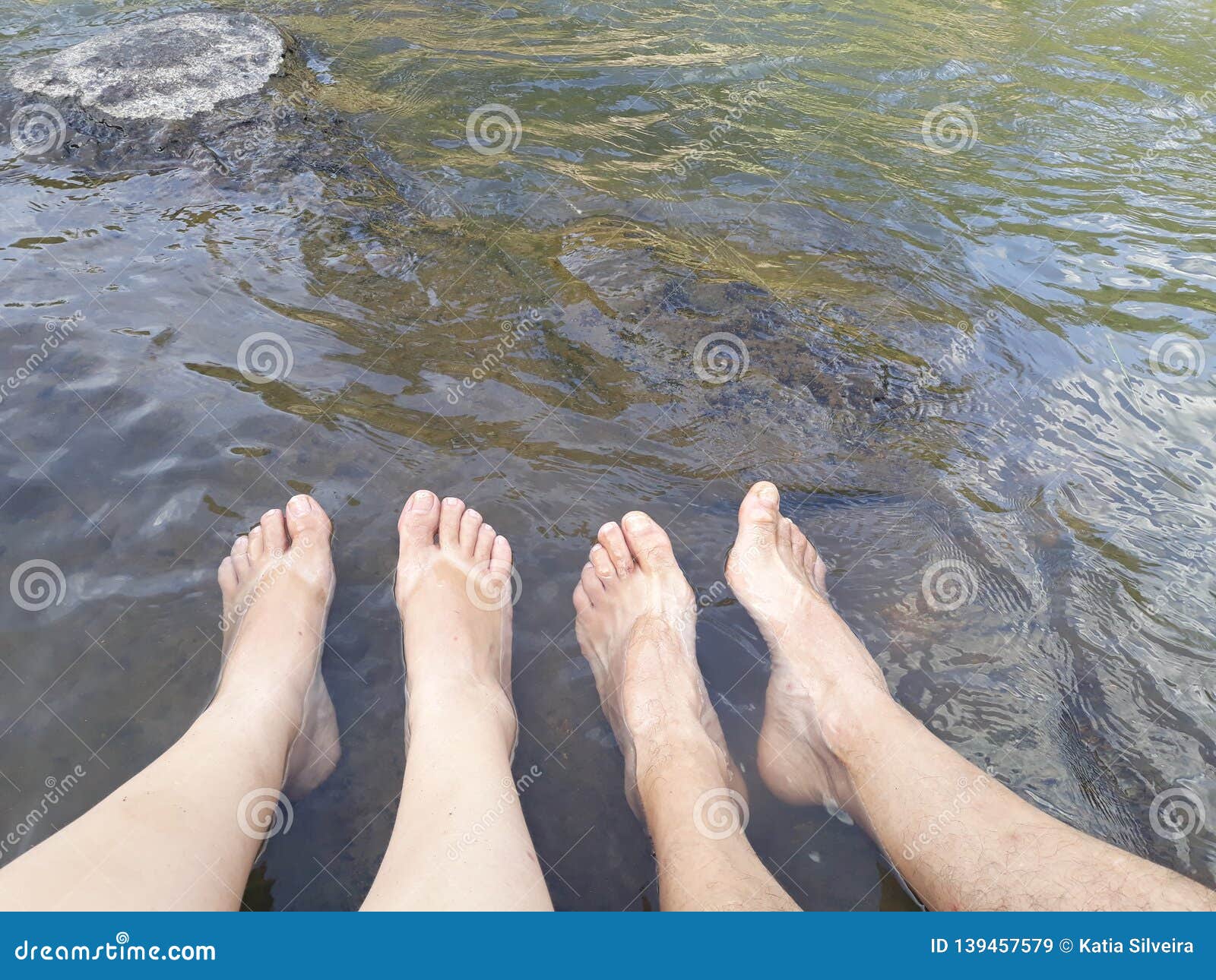 Wet feet in cold water stock image. Image of feet, watering - 139457579