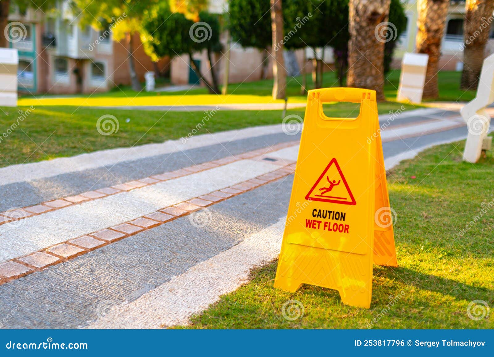 Wet Floor Caution Sign on Hotel Stone Path Stock Photo - Image of ...