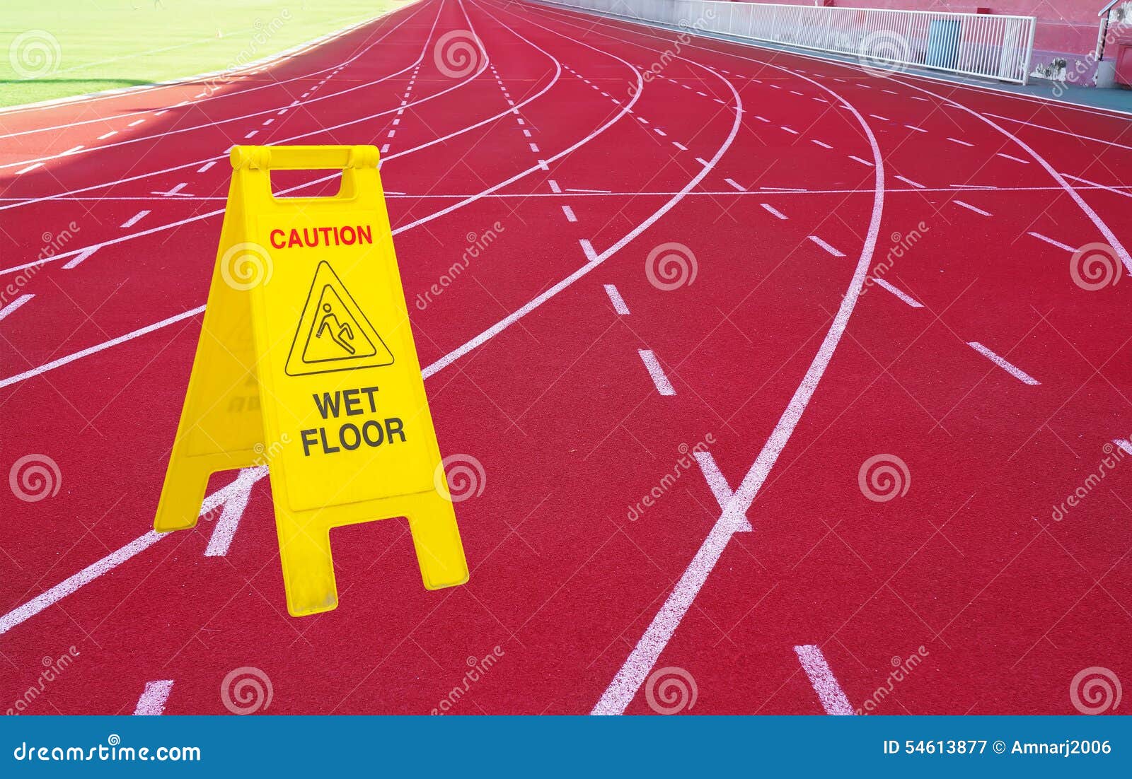 Wet Floor Sign and Running Track Stock Image - Image of sign, track ...