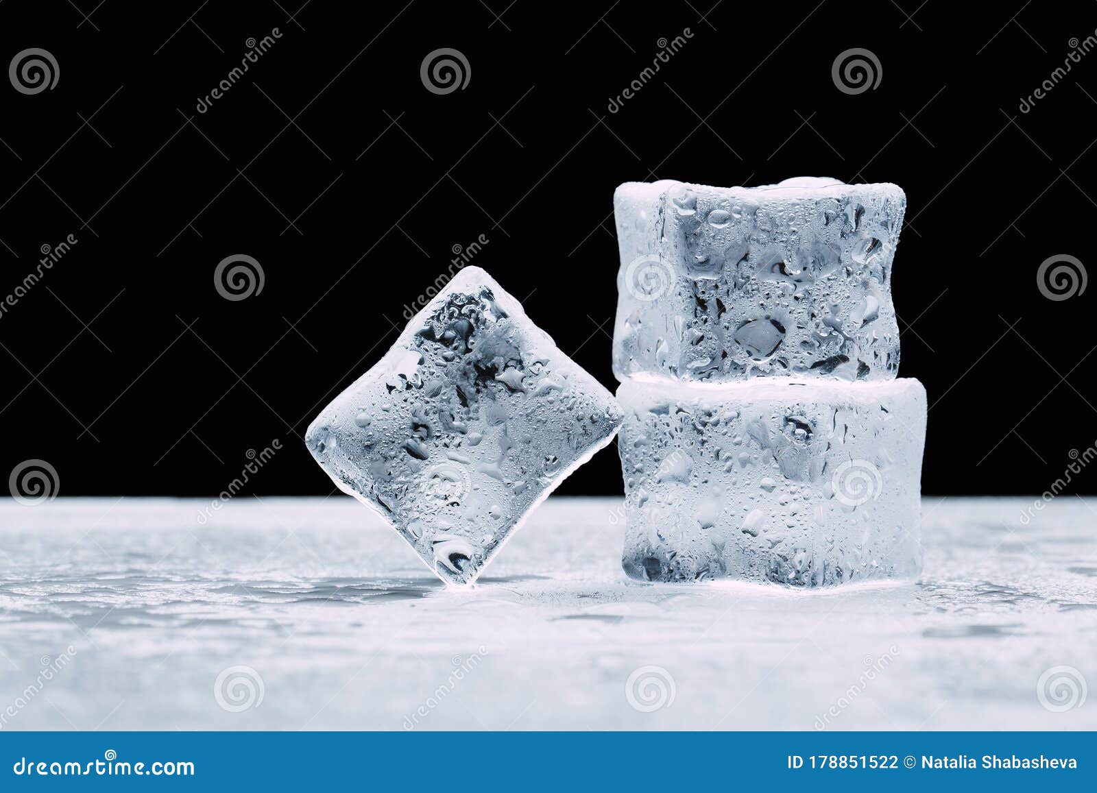 Wet Ice Cubes with Drops on a Dark Black Background Stock Photo - Image ...