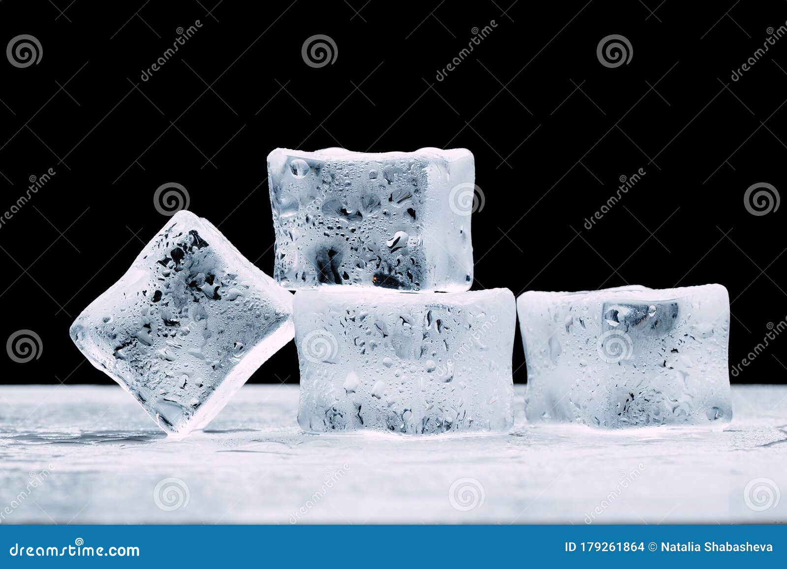 Wet Ice Cubes with Drops on a Dark Black Background Stock Photo - Image ...