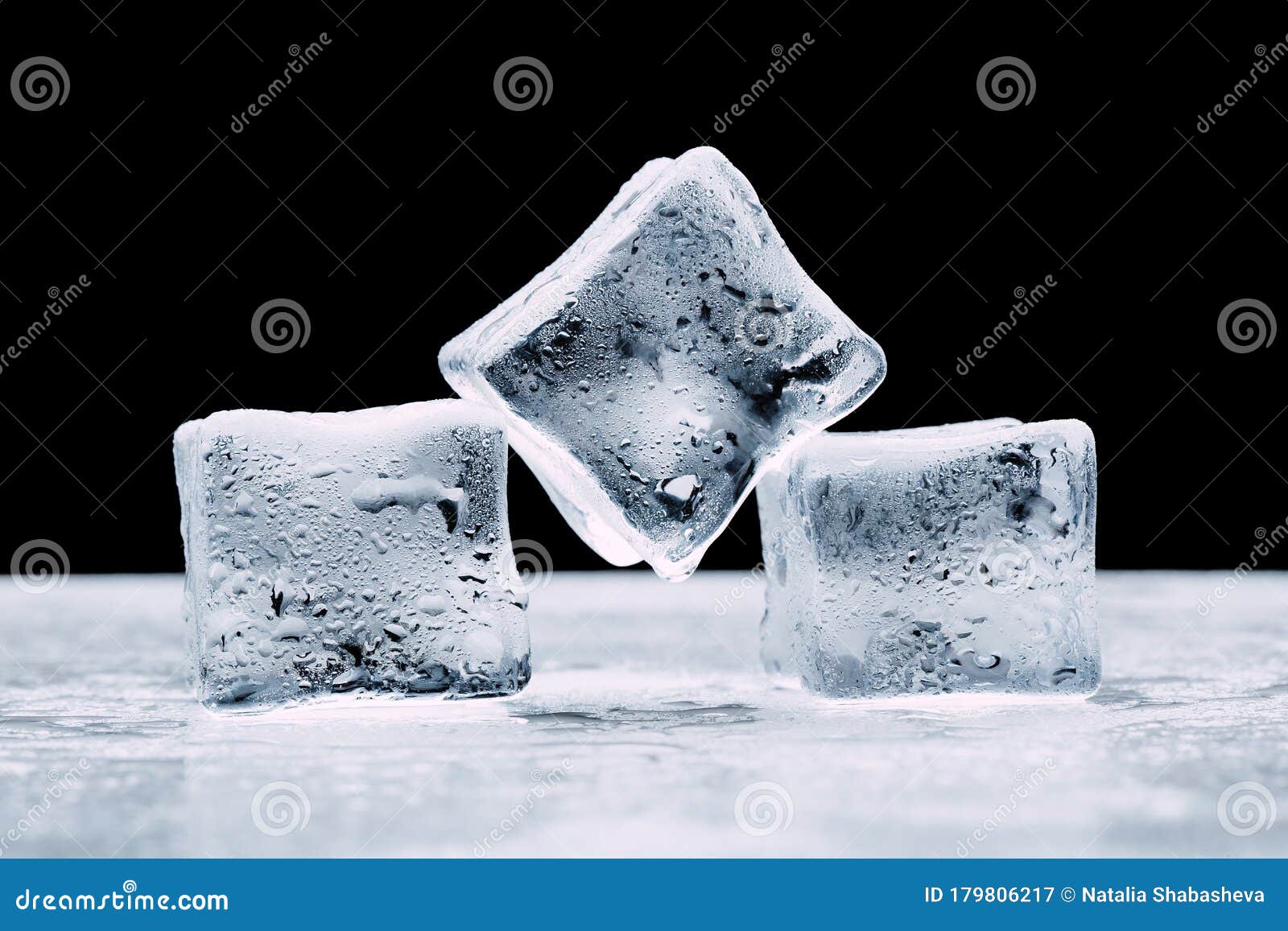 Wet Ice Cubes with Drops on a Dark Black Background Stock Image - Image ...