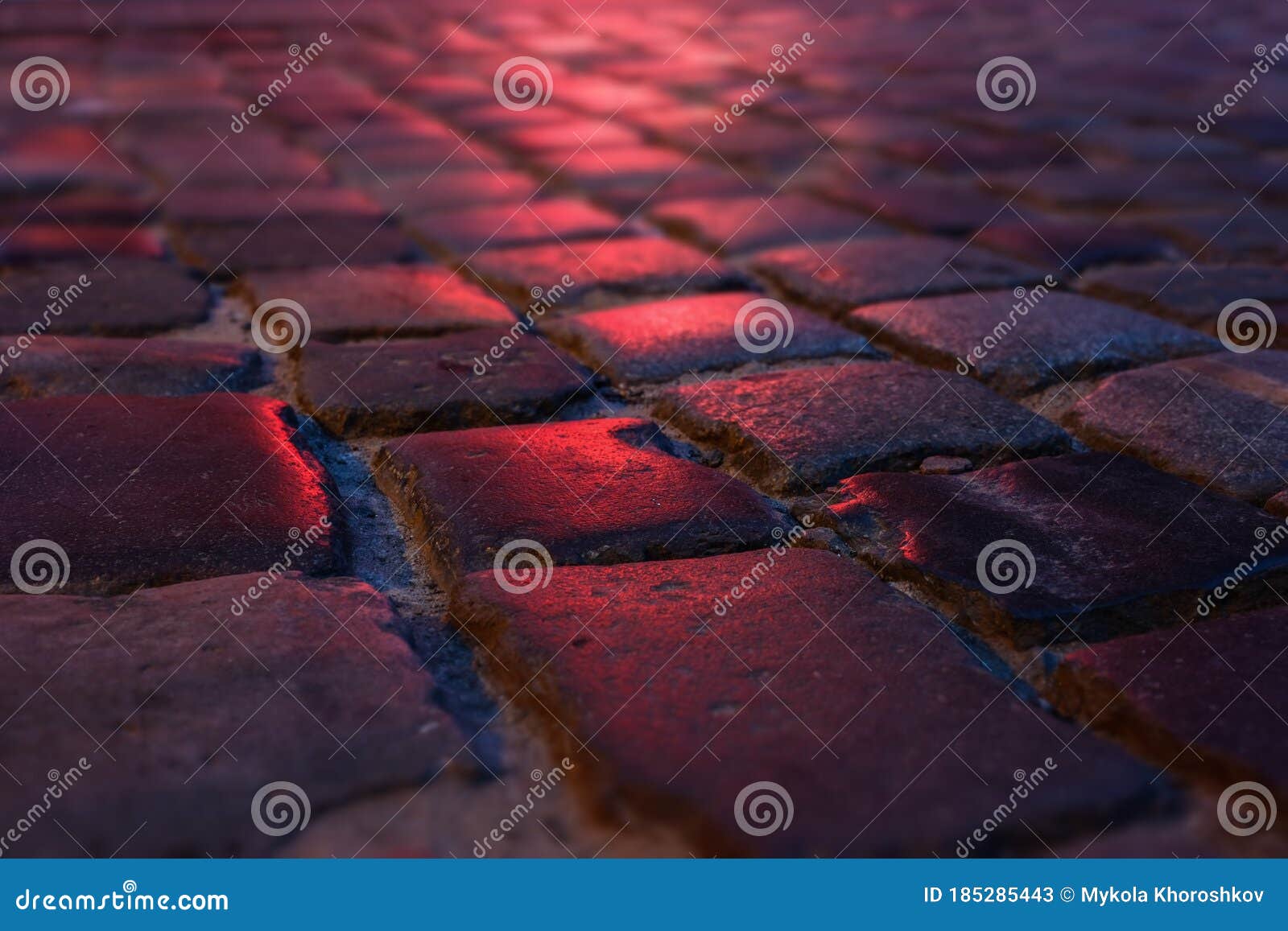 Wet Illuminated by Red Light Cobblestone Street Stock Image - Image of ...