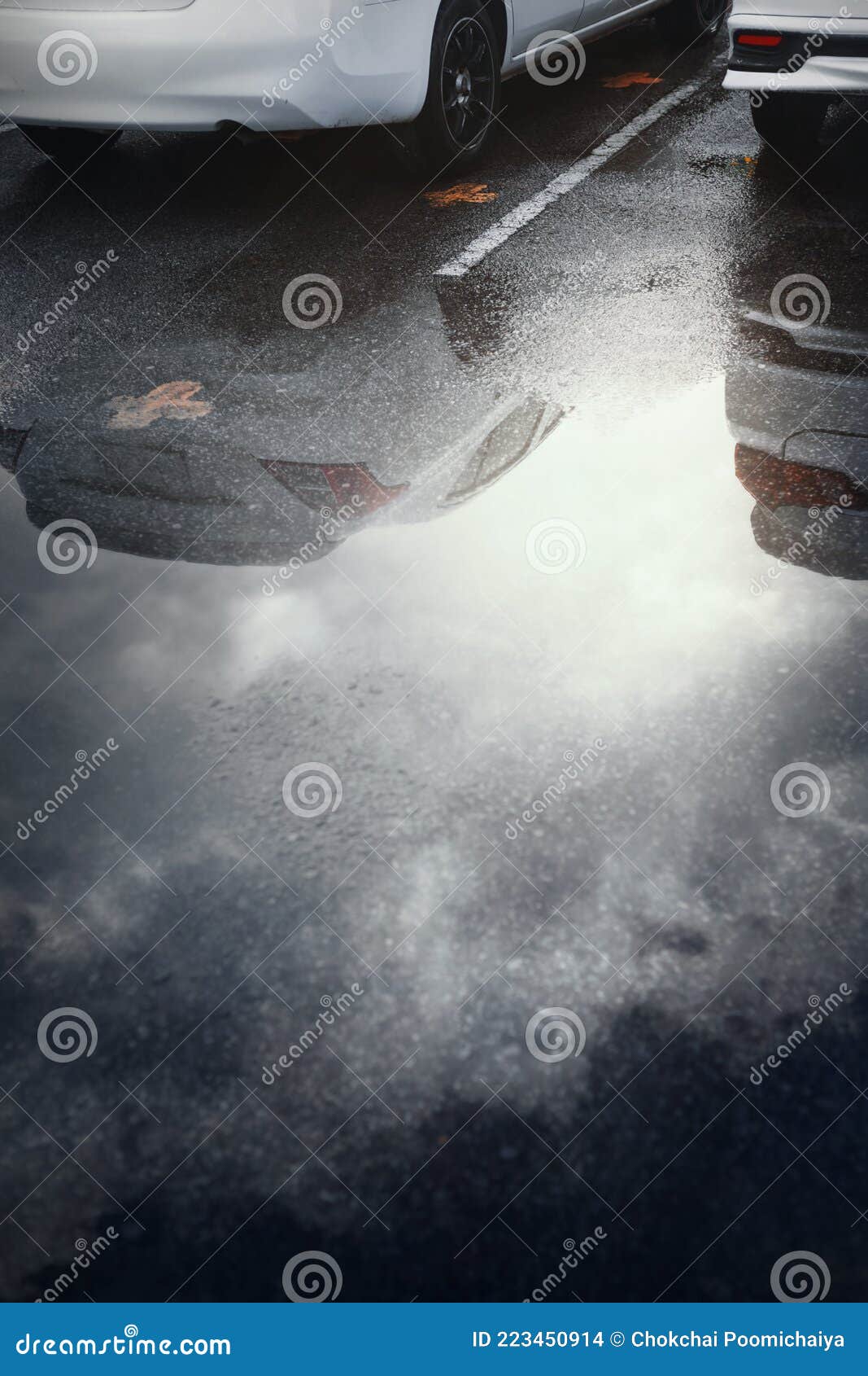 Wet Parking Spaces after Hard Rain Fall with Reflection of Car in ...
