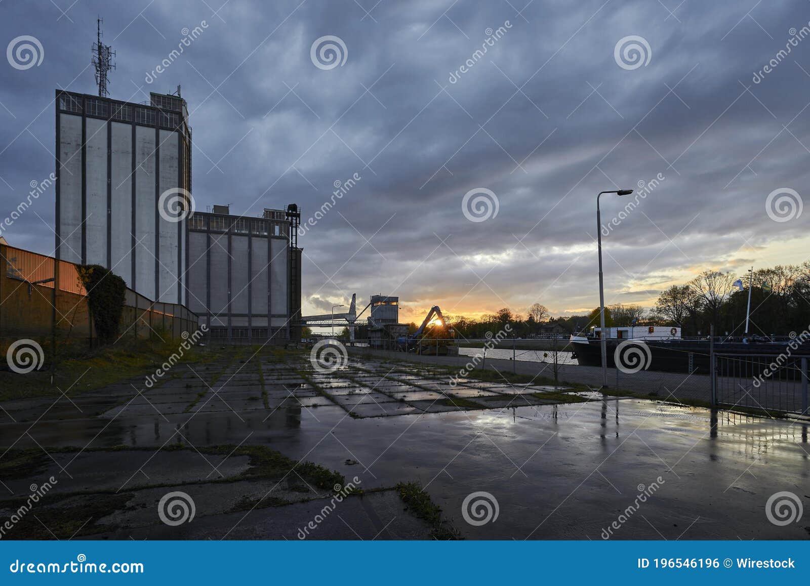 Wet Pathway after Rain on Background of Buildings Stock Photo - Image ...