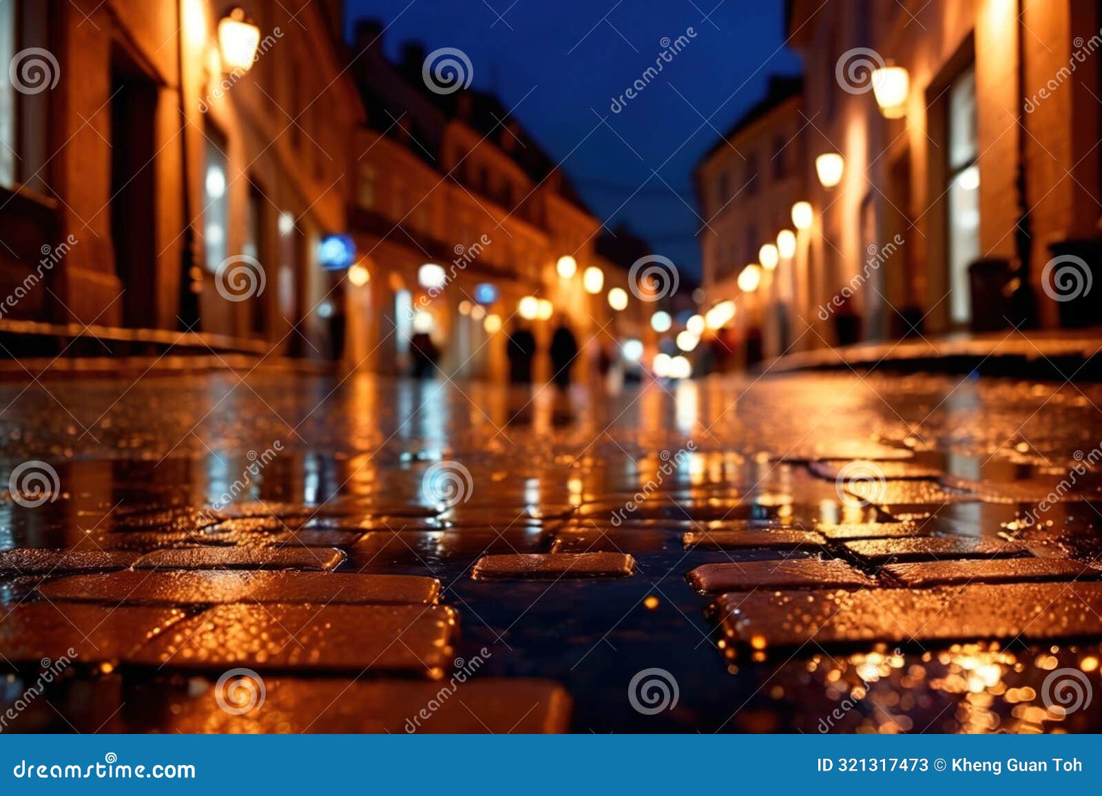 Wet Paving Stones Of A Street After It Rained At Night With Bokeh