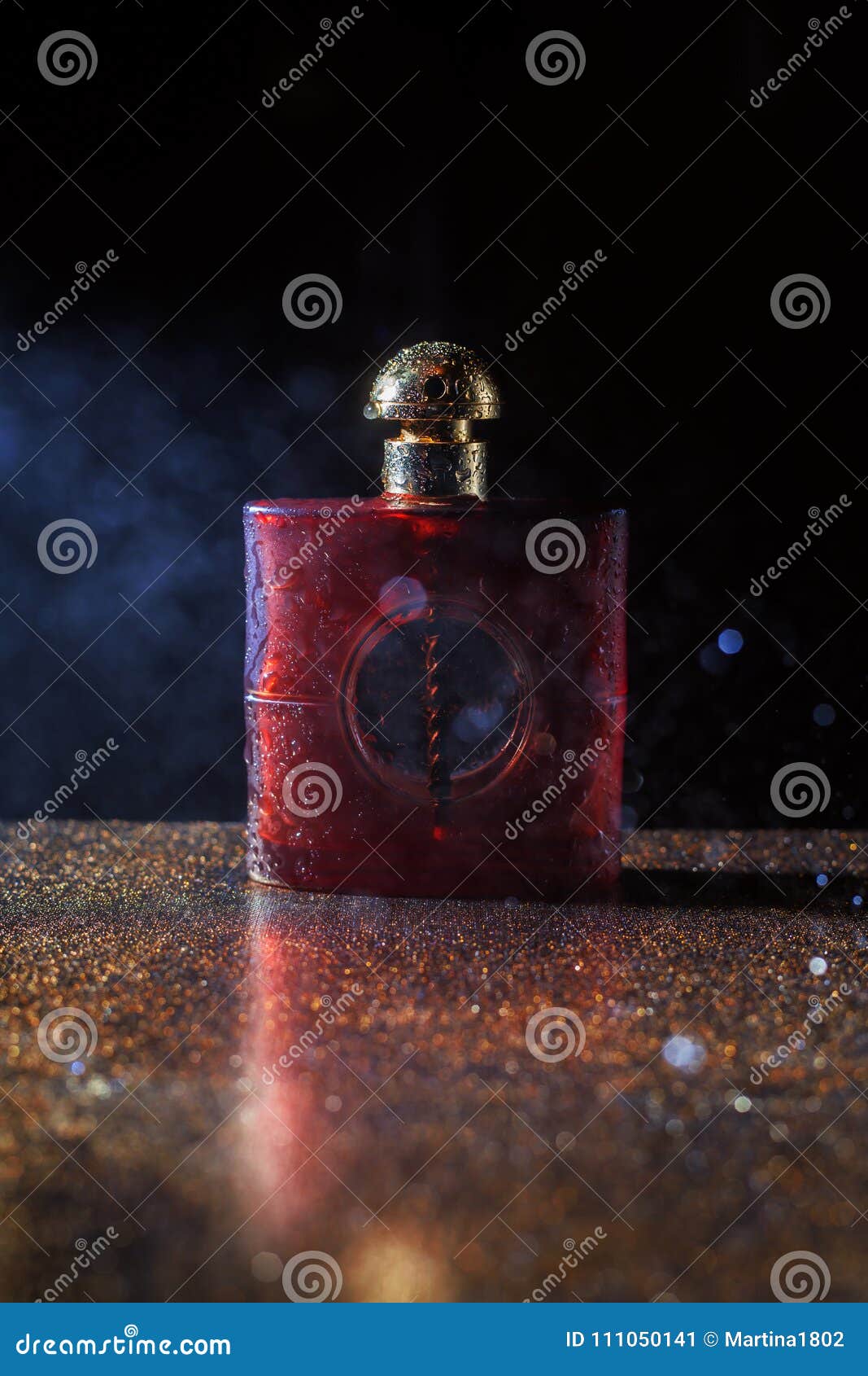Wet red bottle of perfume stock image. Image of luxury - 111050141