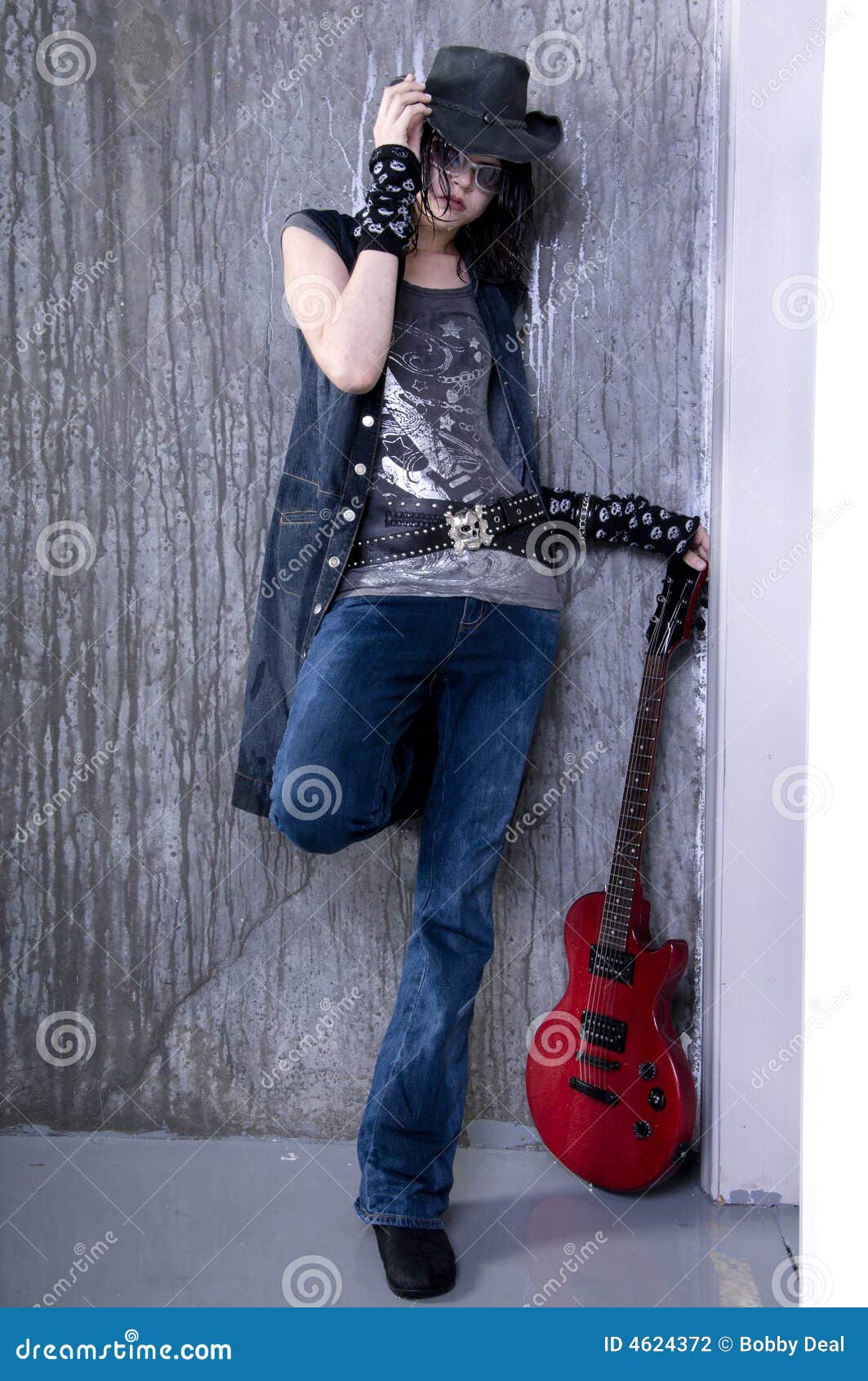 Wet Rocker stock photo. Image of musician, cowboy, skull - 4624372