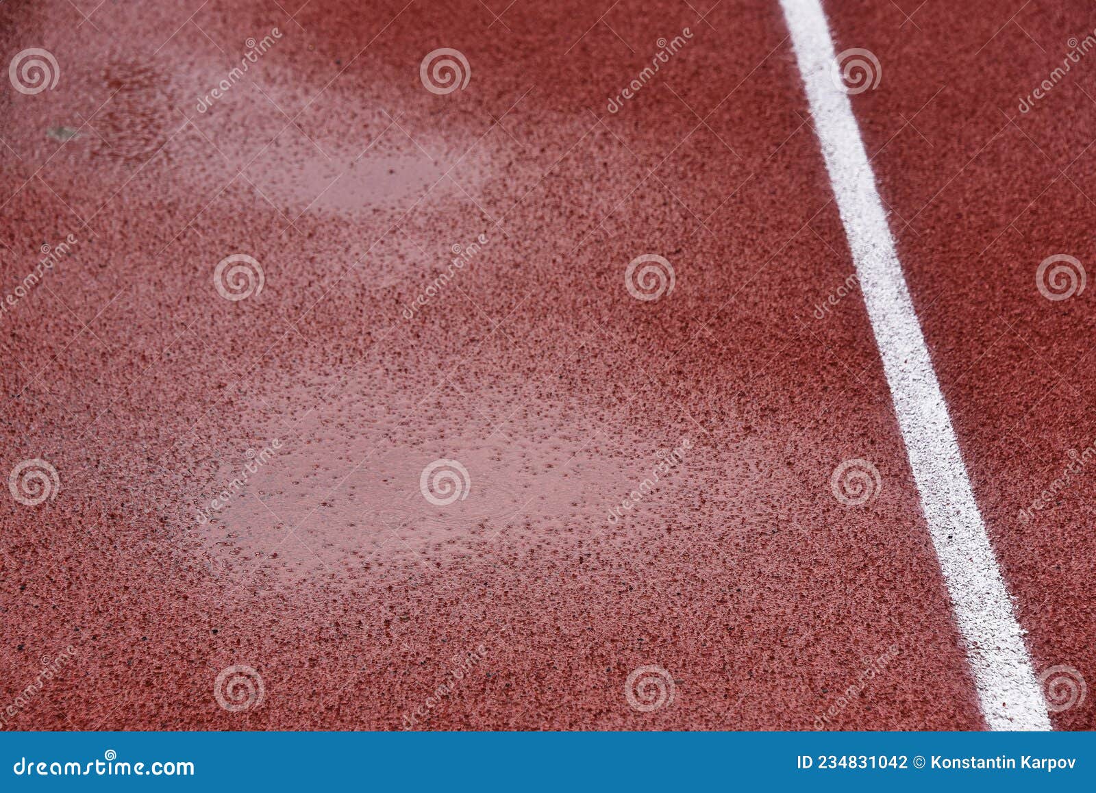 Wet Running Track Close-up at Stadium. Puddles after the Rain Stock ...